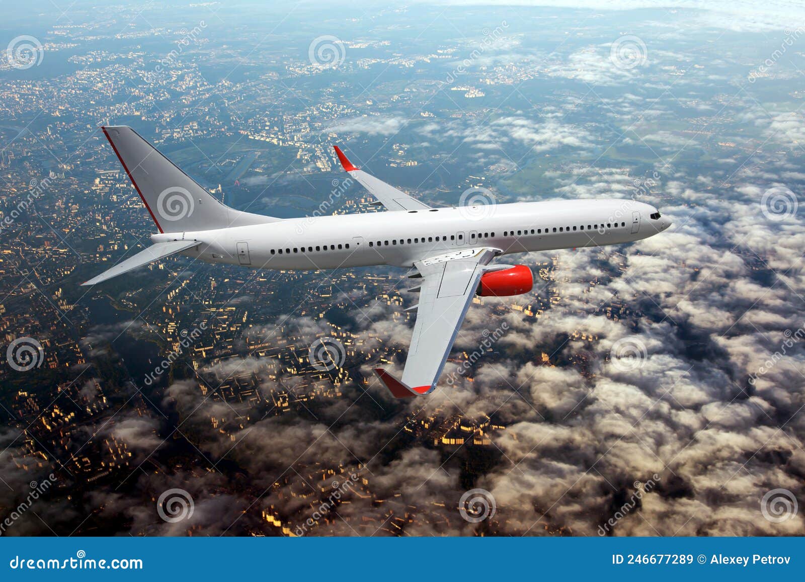 Passenger Plane Fly High Over the Clouds. View from Above Stock Image ...