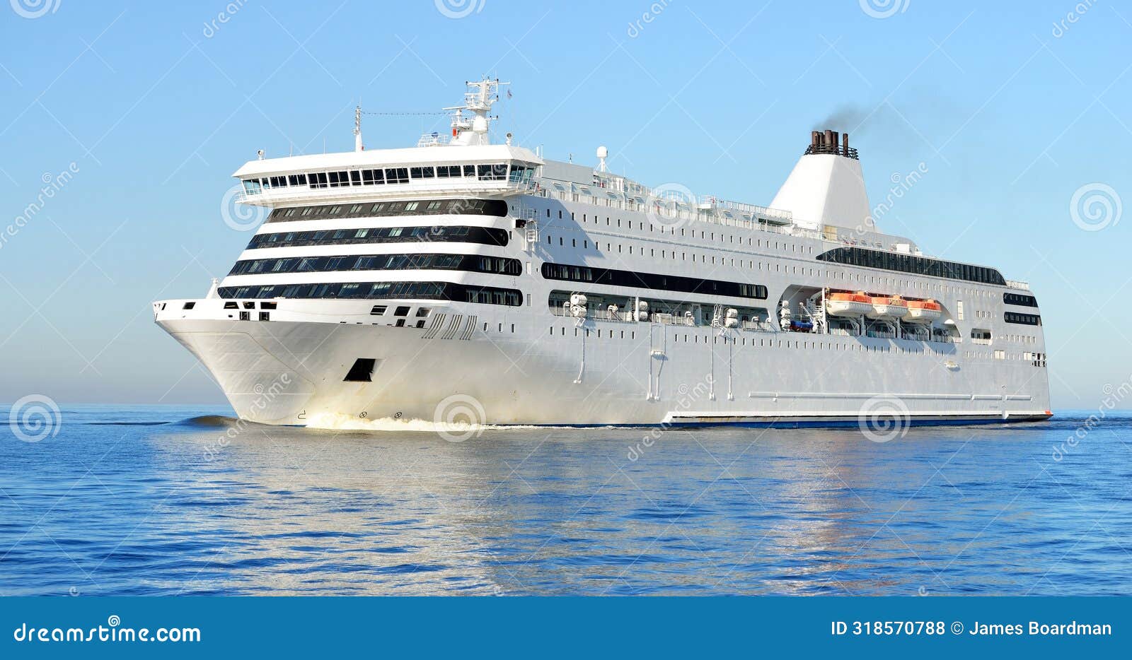 White Passenger Ferry Ship Sailing in Still Water Stock Photo - Image ...