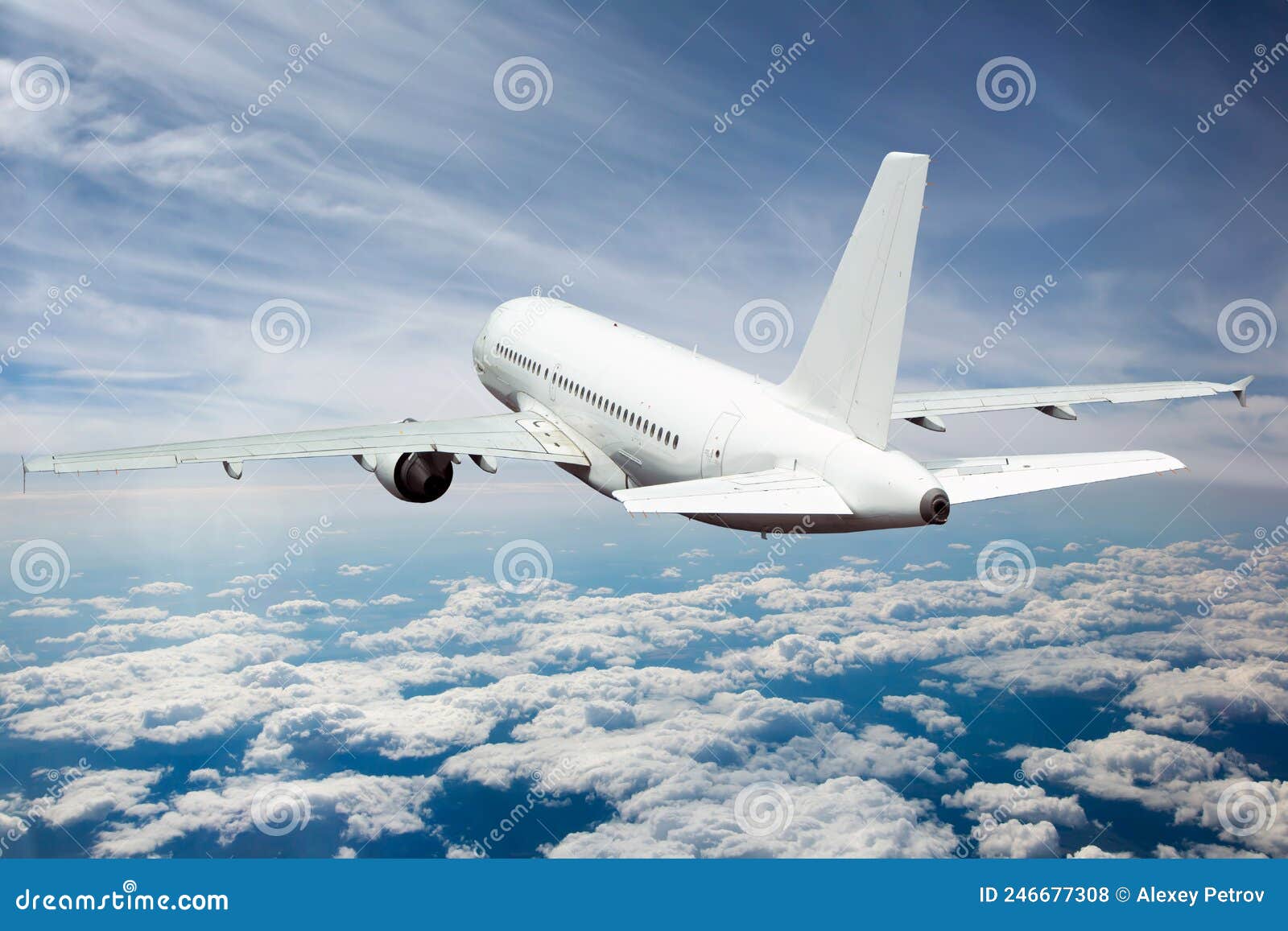 White Passenger Plane Fly Away Above the Clouds. Back View of Aircraft ...
