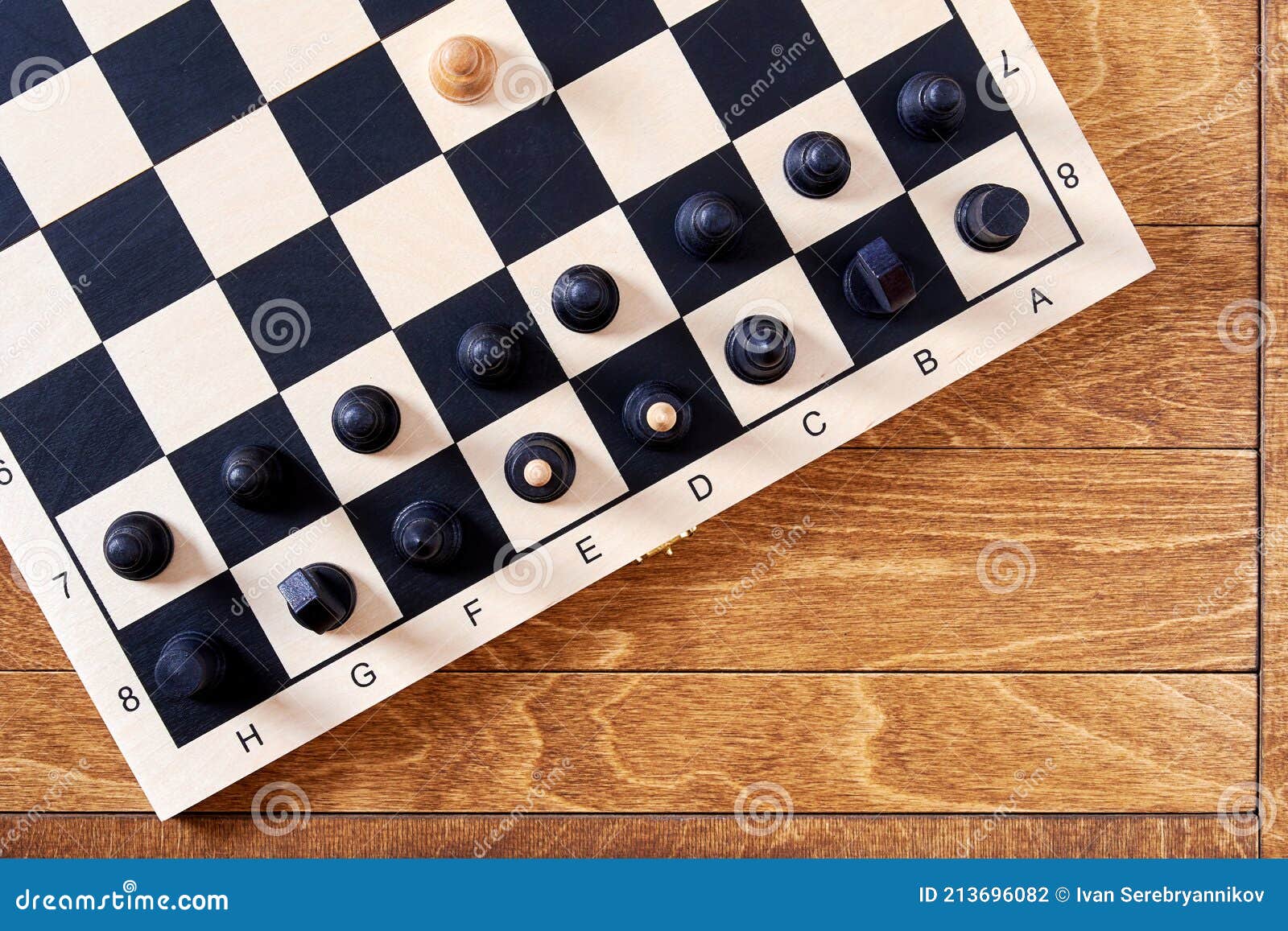 White Pawn Attacking Black Figures on the Chessboard after the First ...