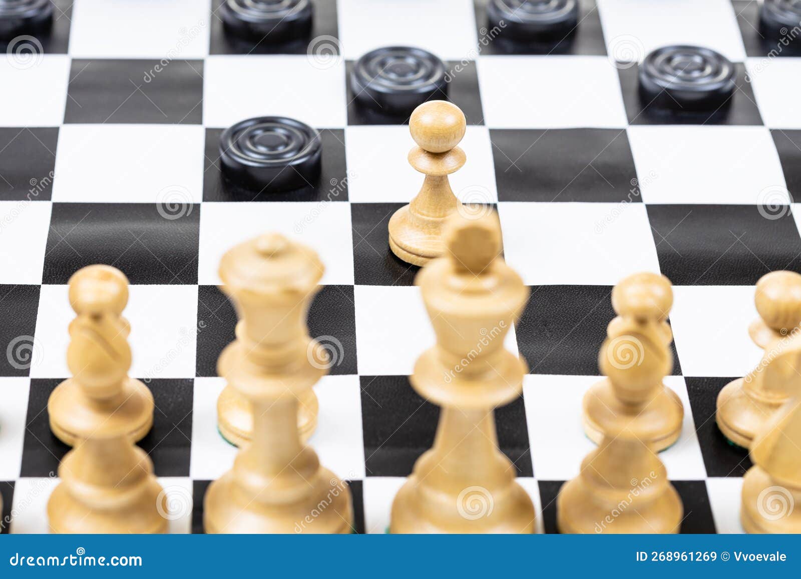 White Pawn and Black Checkers Disc Moves Closeup Stock Image - Image of ...