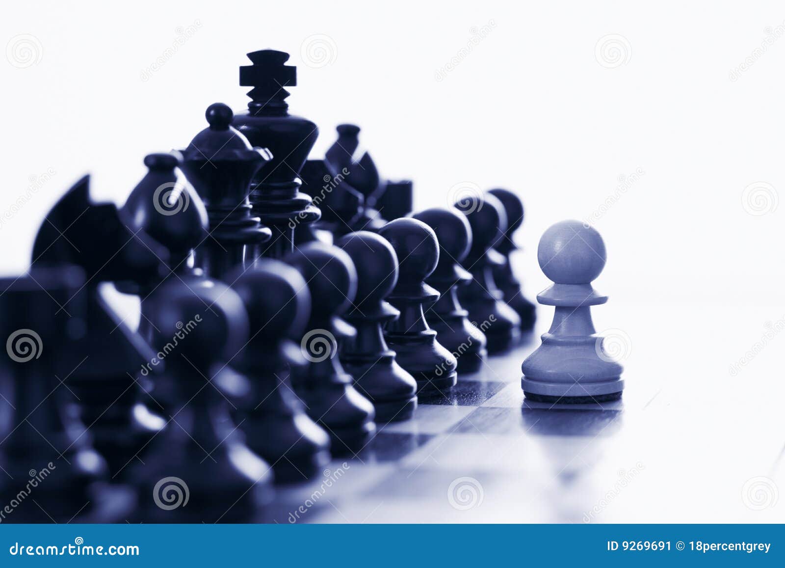 White Pawn Challenging Black Chess Pieces Stock Image - Image of ...