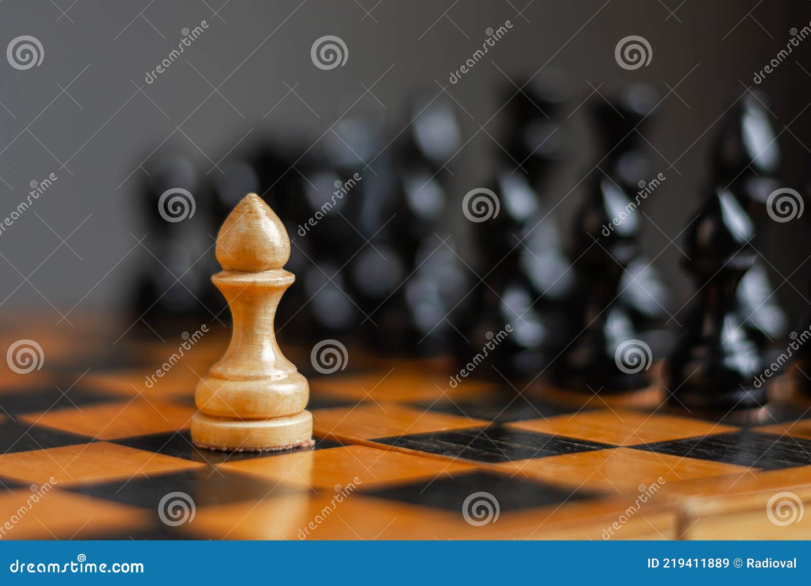 White Pawn, in Front of Black, on a Chessboard. Selective Focus ...