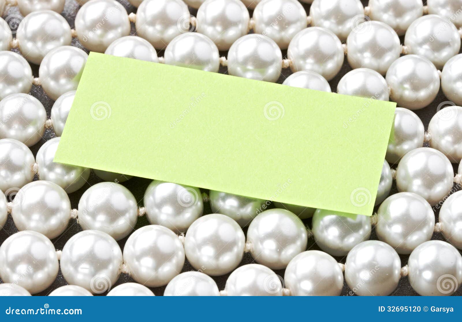 White pearl and card stock photo. Image of green, gemstone - 32695120