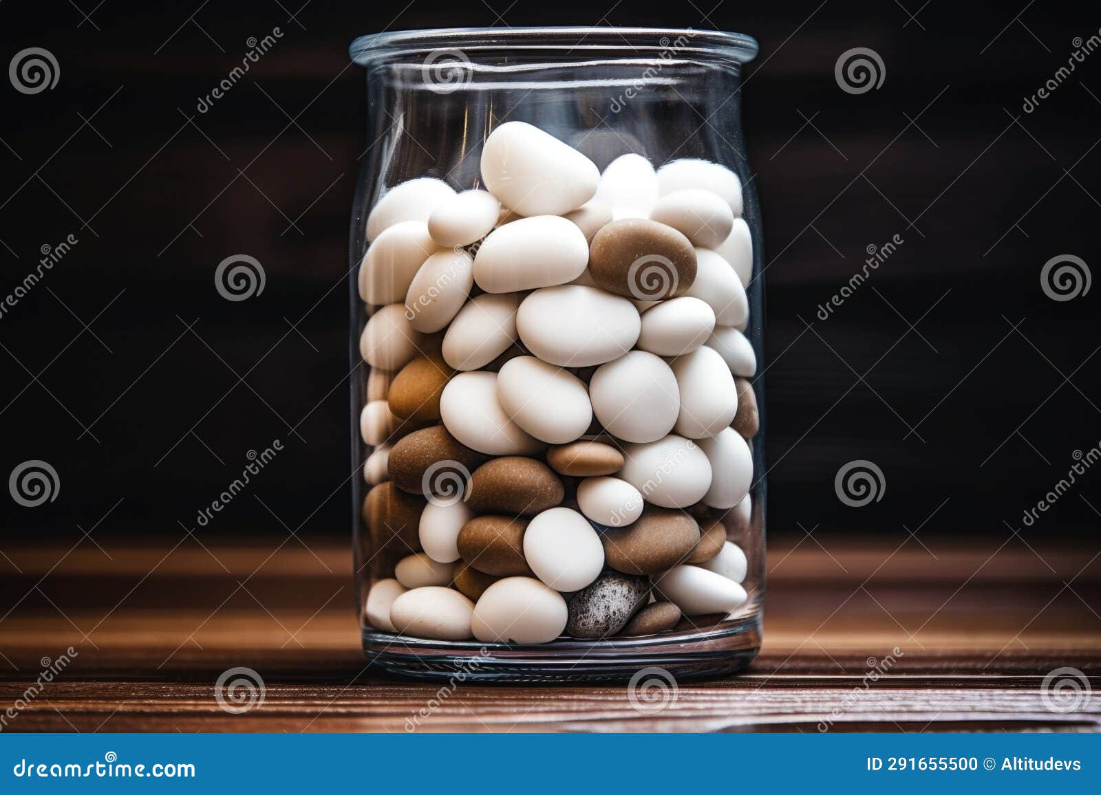 White Pebbles Stacked in a Glass Jar Stock Photo - Image of simplicity ...