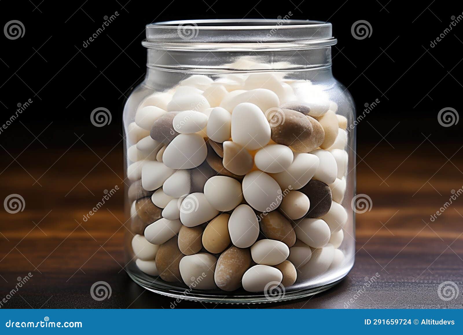 White Pebbles Stacked in a Glass Jar Stock Photo - Image of home ...