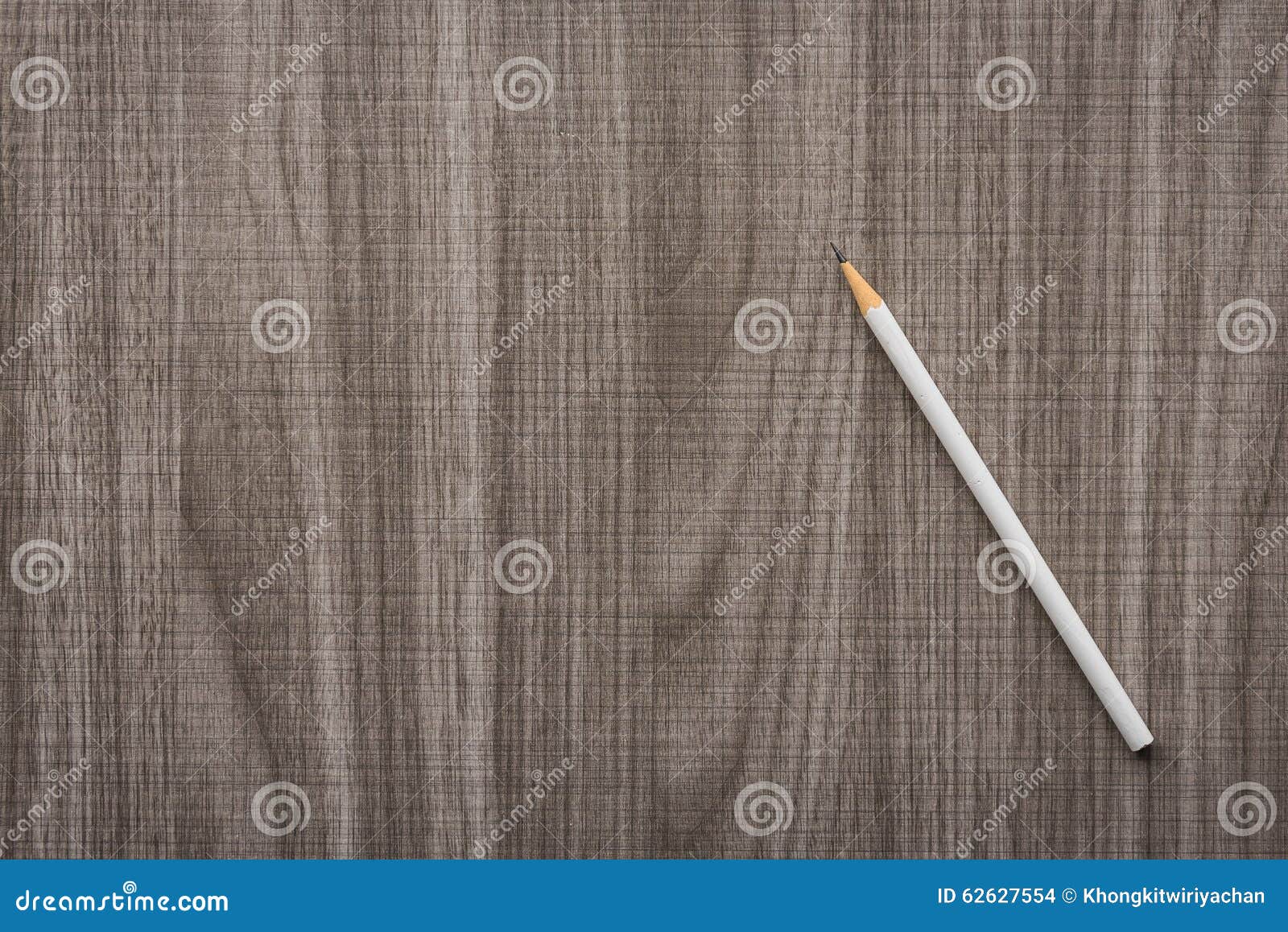 White pencil on table stock photo. Image of difference - 62627554
