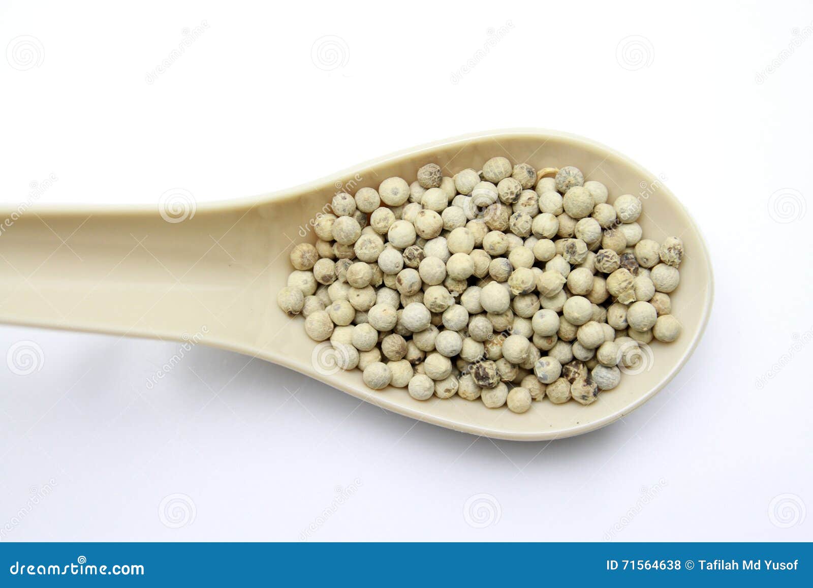 White pepper in a spoon stock photo. Image of anise, coriander - 71564638