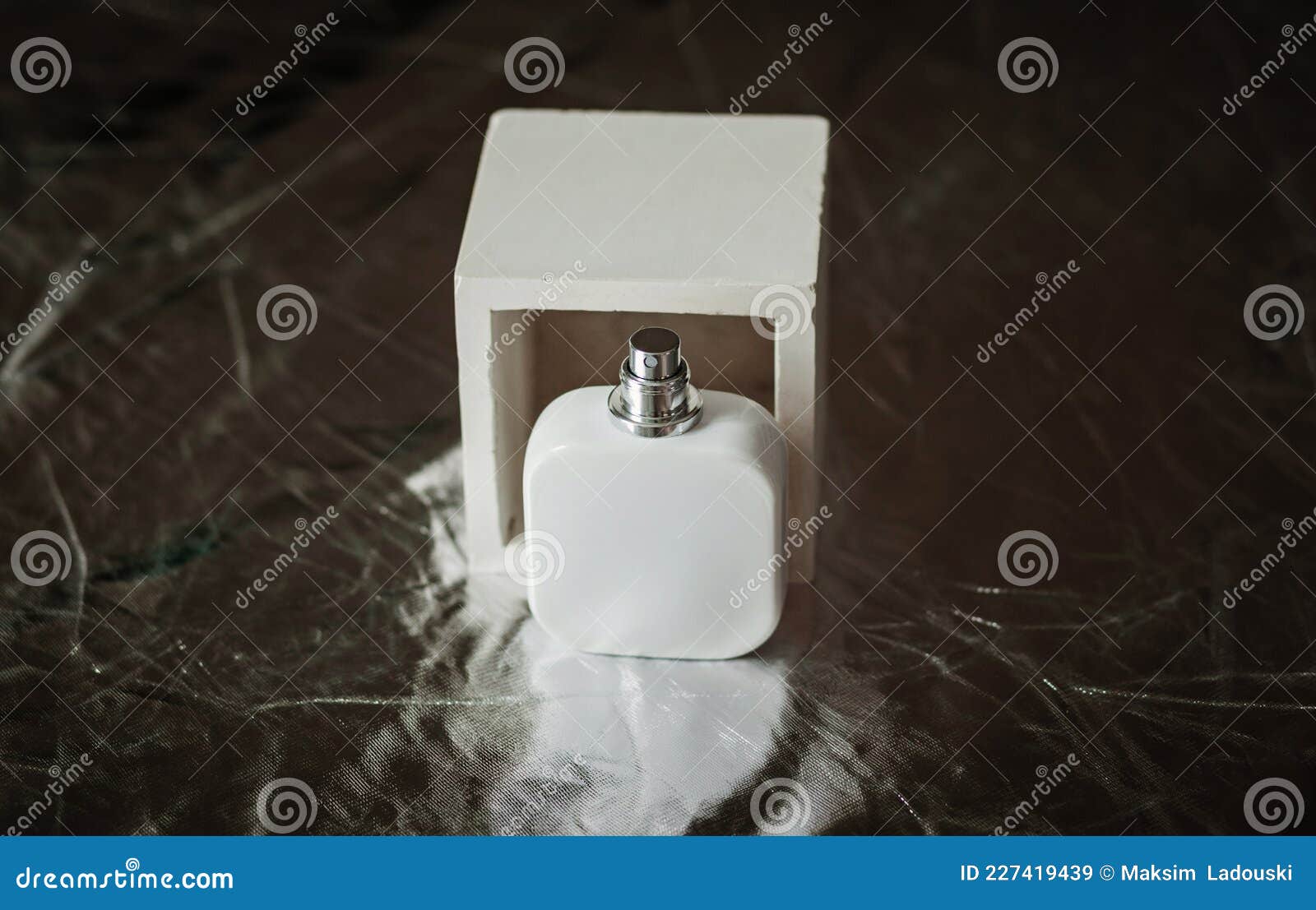 White perfume bottle stock image. Image of closeup, cosmetic - 227419439