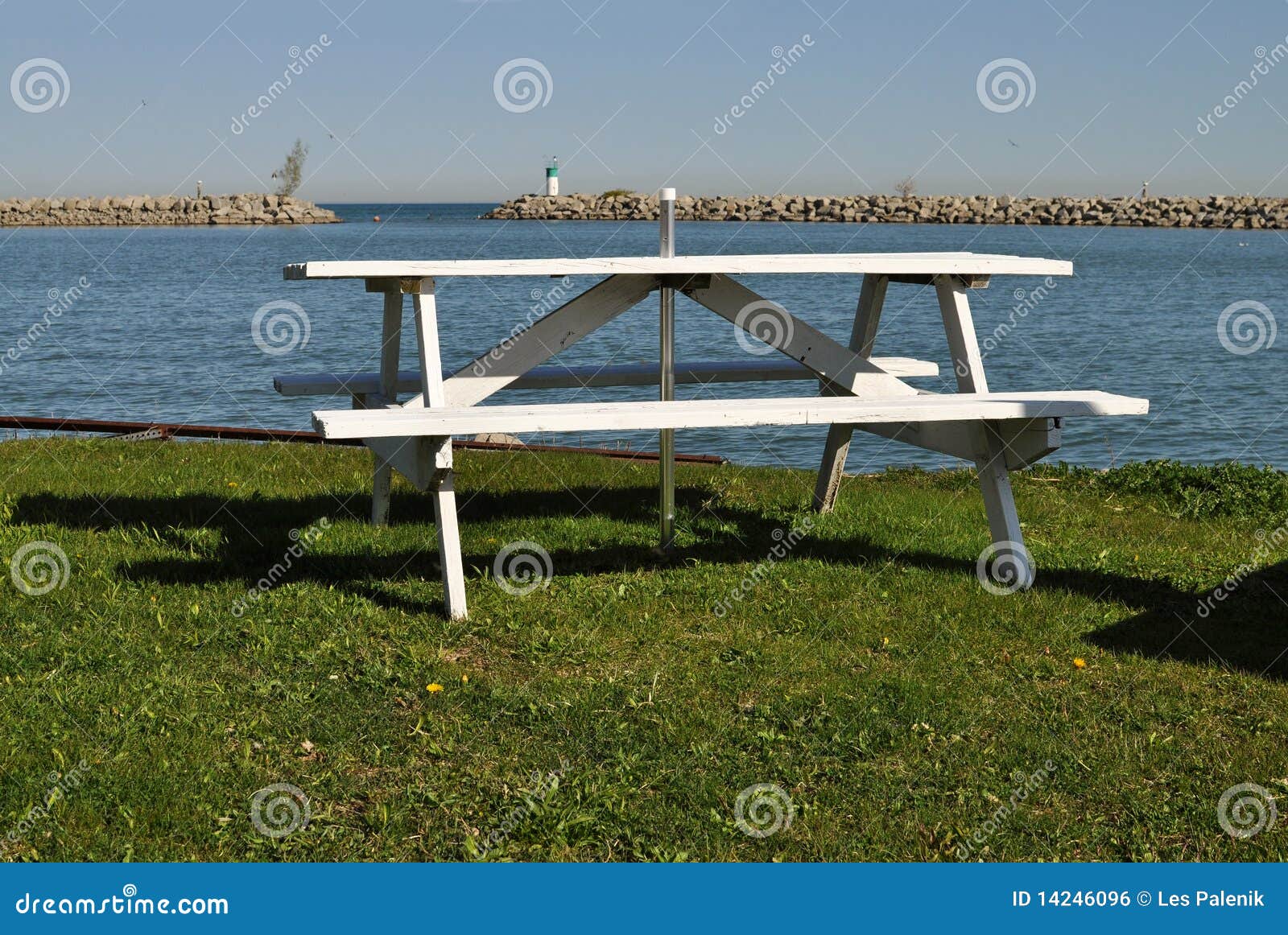 White Picnic Table Near Water Stock Photo - Image of navigation, blue ...