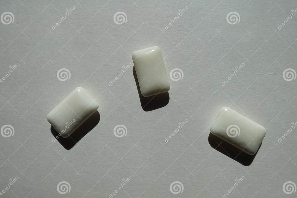3 White Pieces of Chewing Gum from Above Stock Image - Image of teeth ...