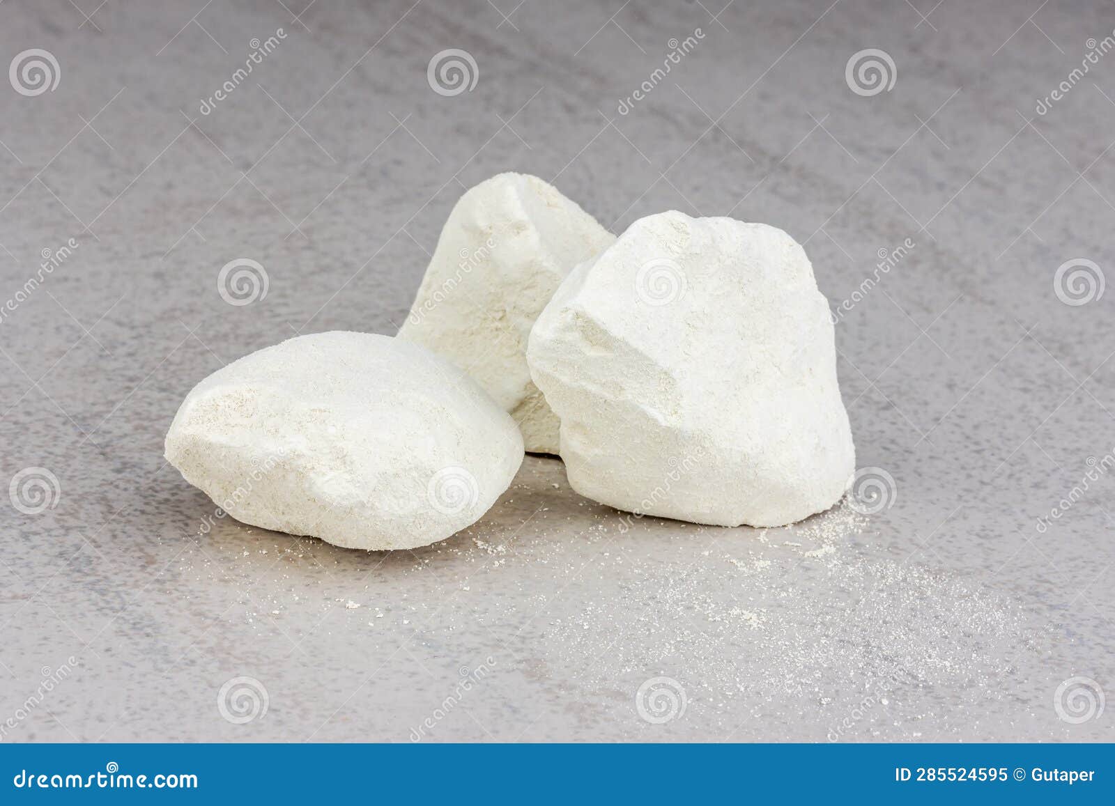 White Pieces of Quicklime Close-up on a Gray Background. Stock Image ...