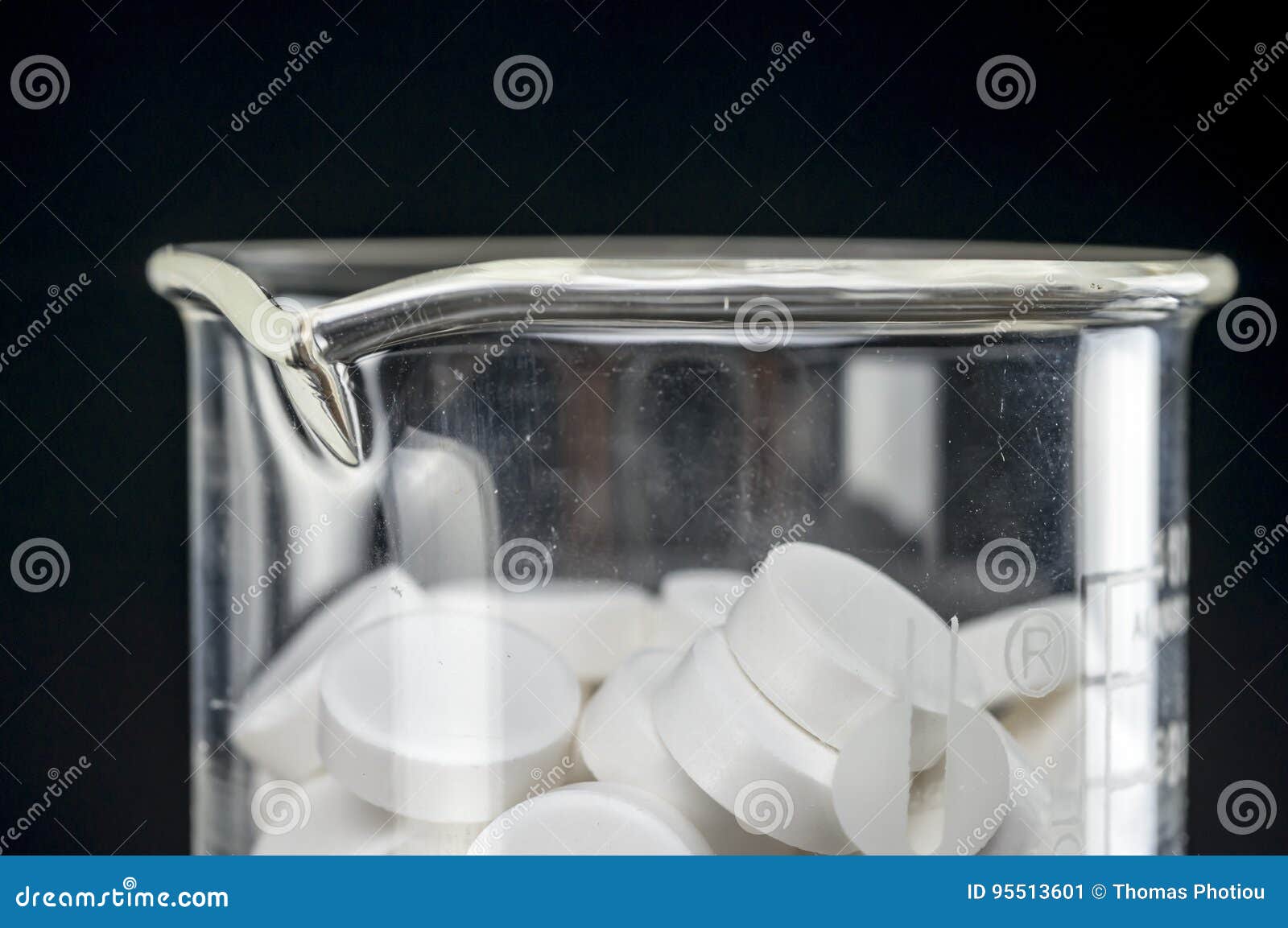 White Pill Tablets in Beaker Stock Image - Image of beaker, drug: 95513601