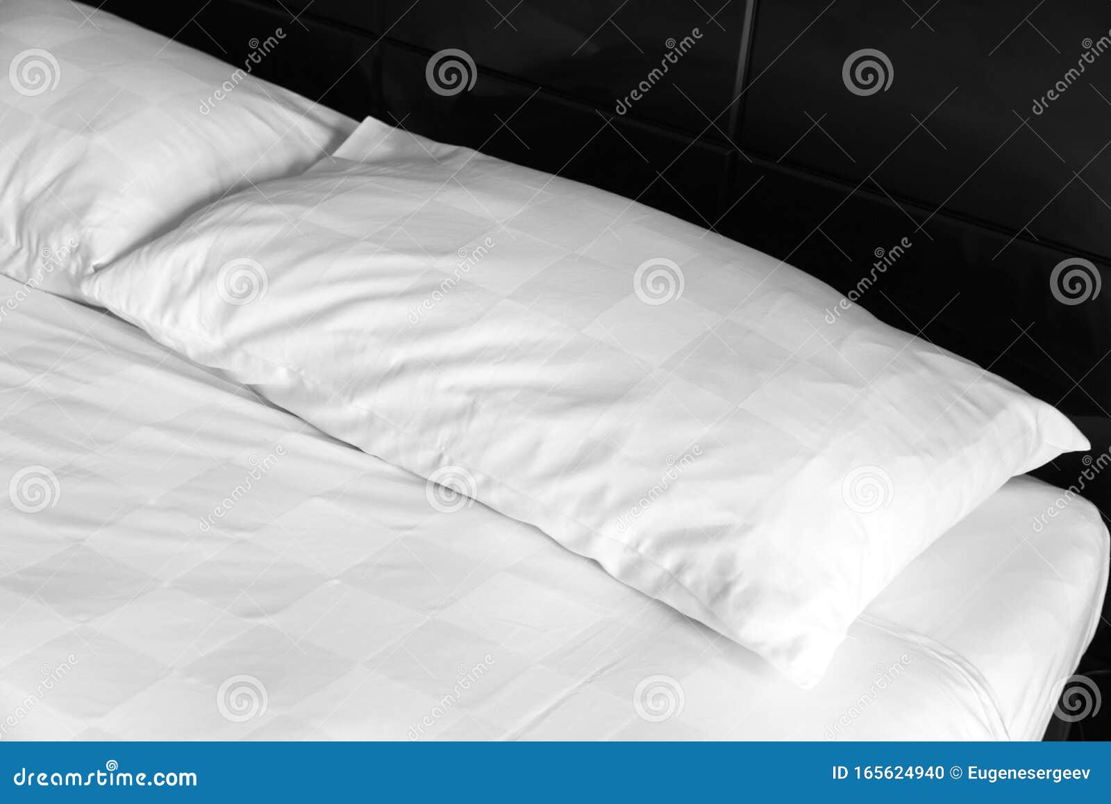 White Pillow Lays at an Empty Bed Stock Photo - Image of comfortable ...