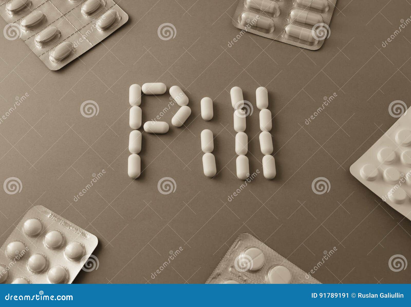 White Pills. Forming the Word - Pill. Near are Tablets Over Grey ...