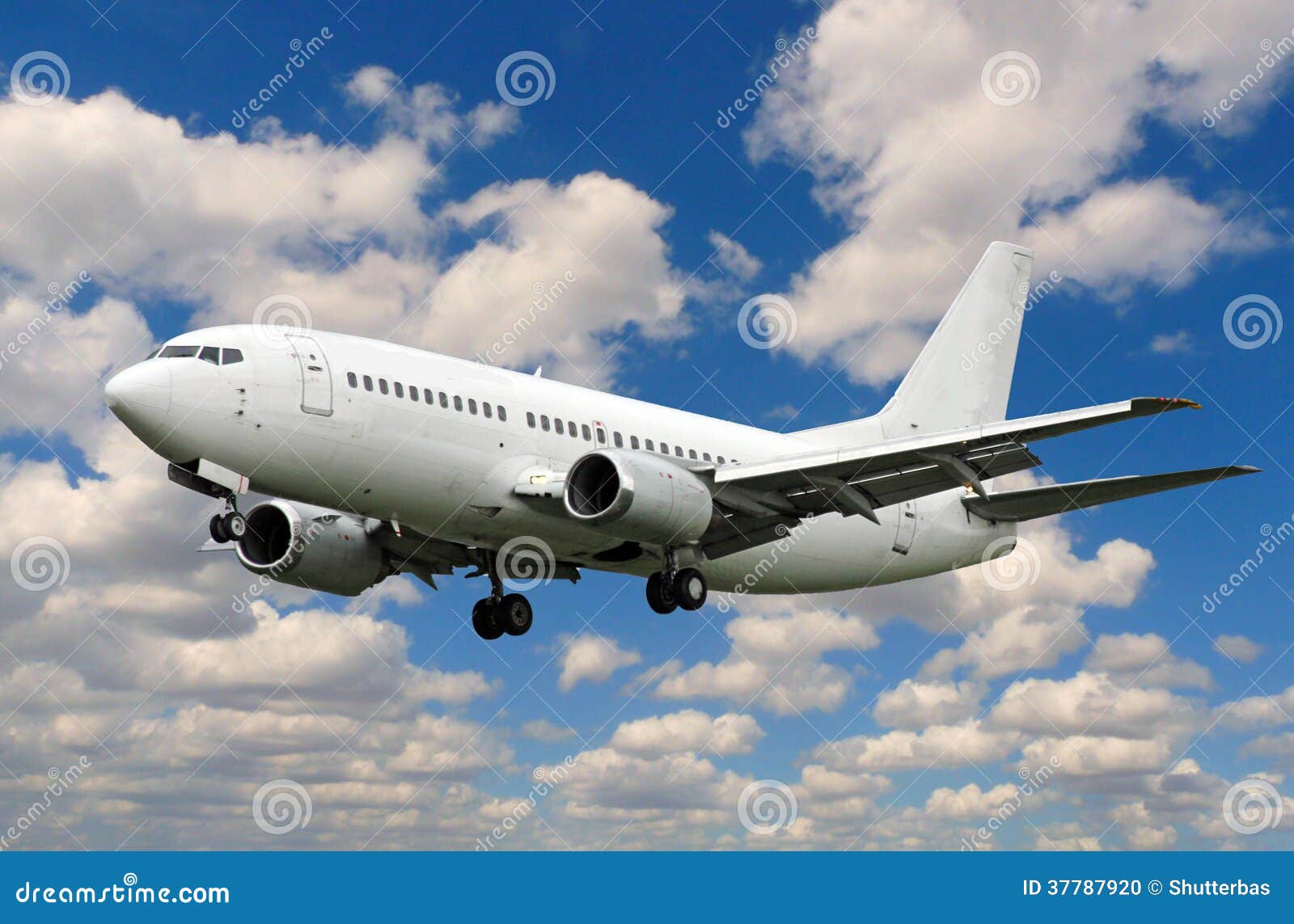 White plane landing stock photo. Image of cloudy, airliner - 37787920