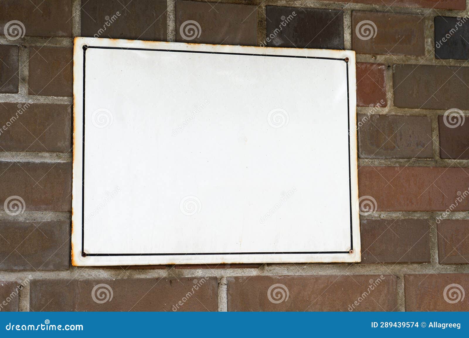 White Plaque on a Brick Wall with Space for Text. Informant Pointer ...
