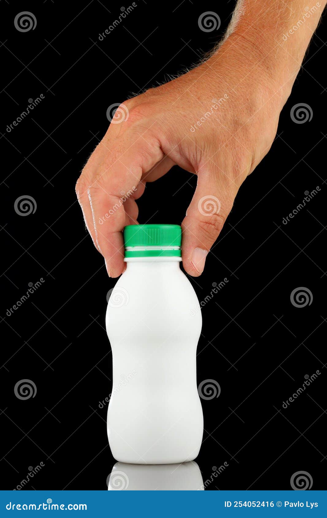 White Plastic Bottle in Hand Stock Photo - Image of drink, industry ...