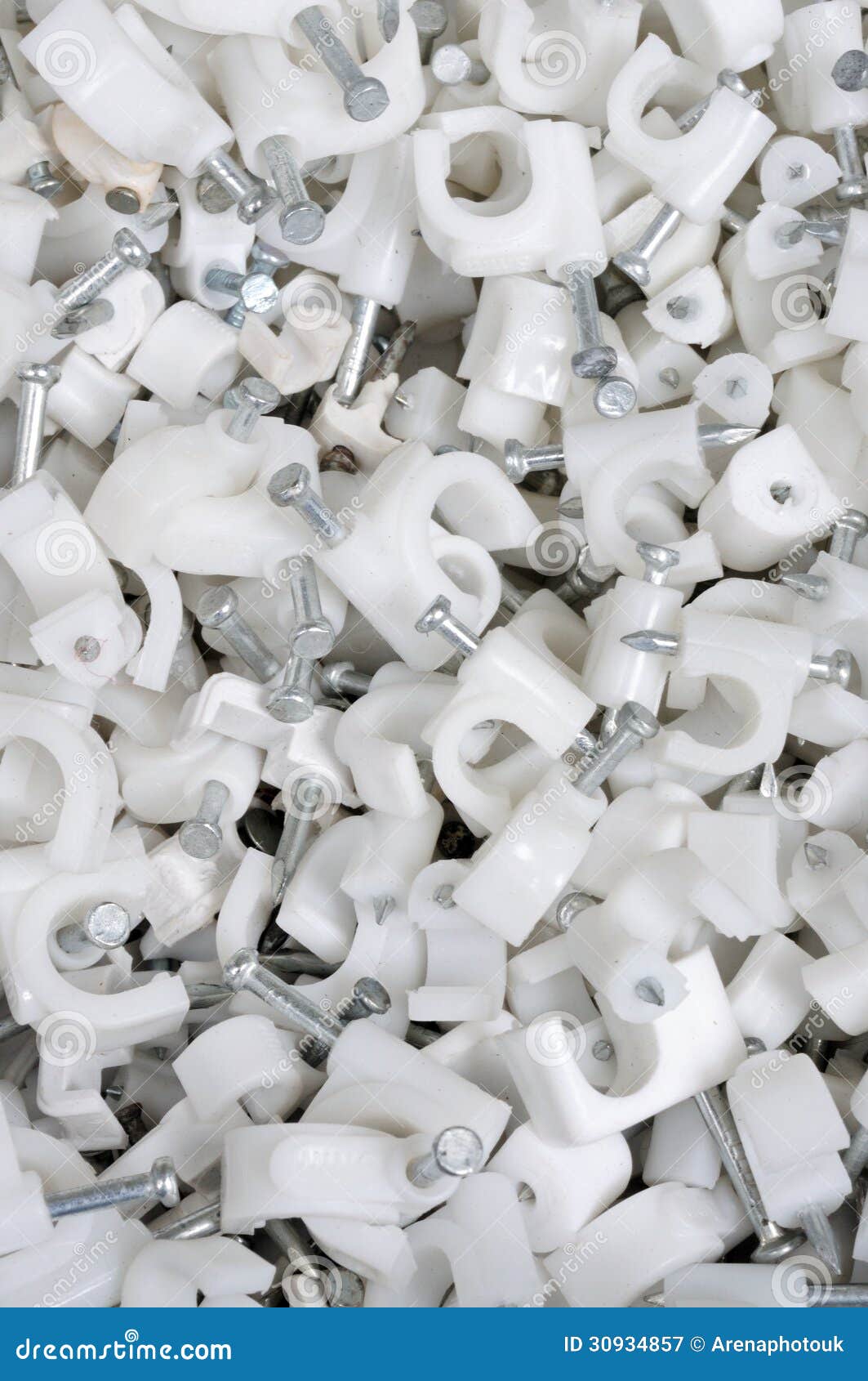 White plastic cable clips. stock image. Image of wire - 30934857