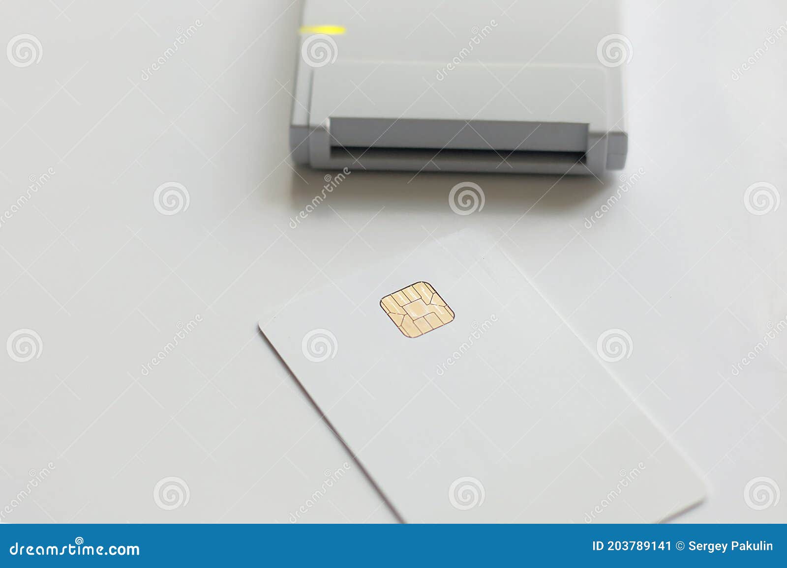 A White Plastic Card and a Personal Data Reader. Theft or Leakage of ...