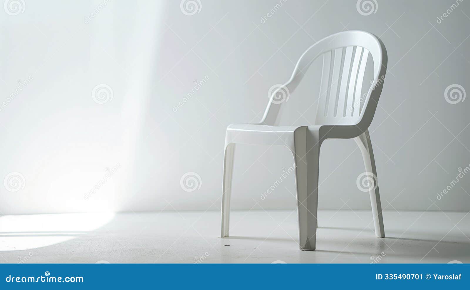 White Plastic Chair with Slatted Backrest in Minimalist Setting. Simple ...