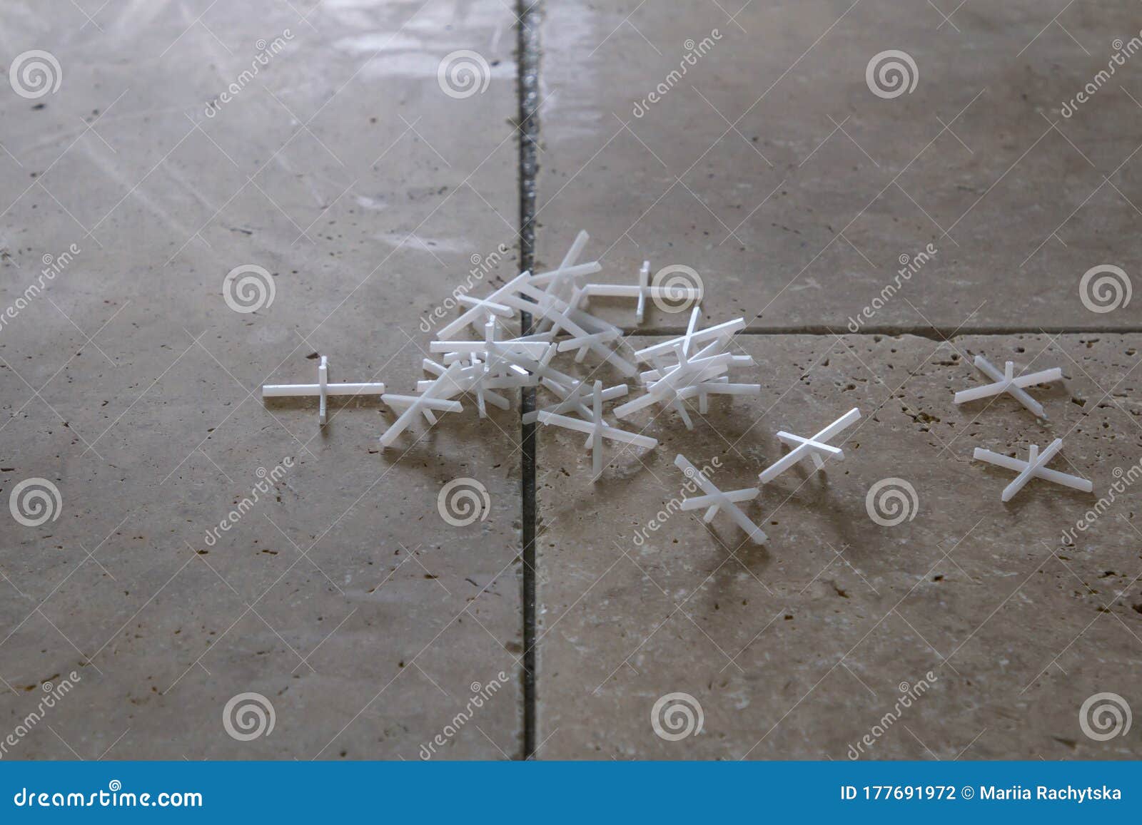 White Plastic Crosses For Laying Tiles, On The Background Of Stone ...