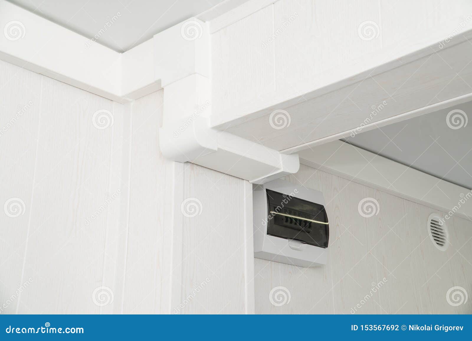 White Plastic Electric Guard on a White Wall Stock Photo - Image of ...