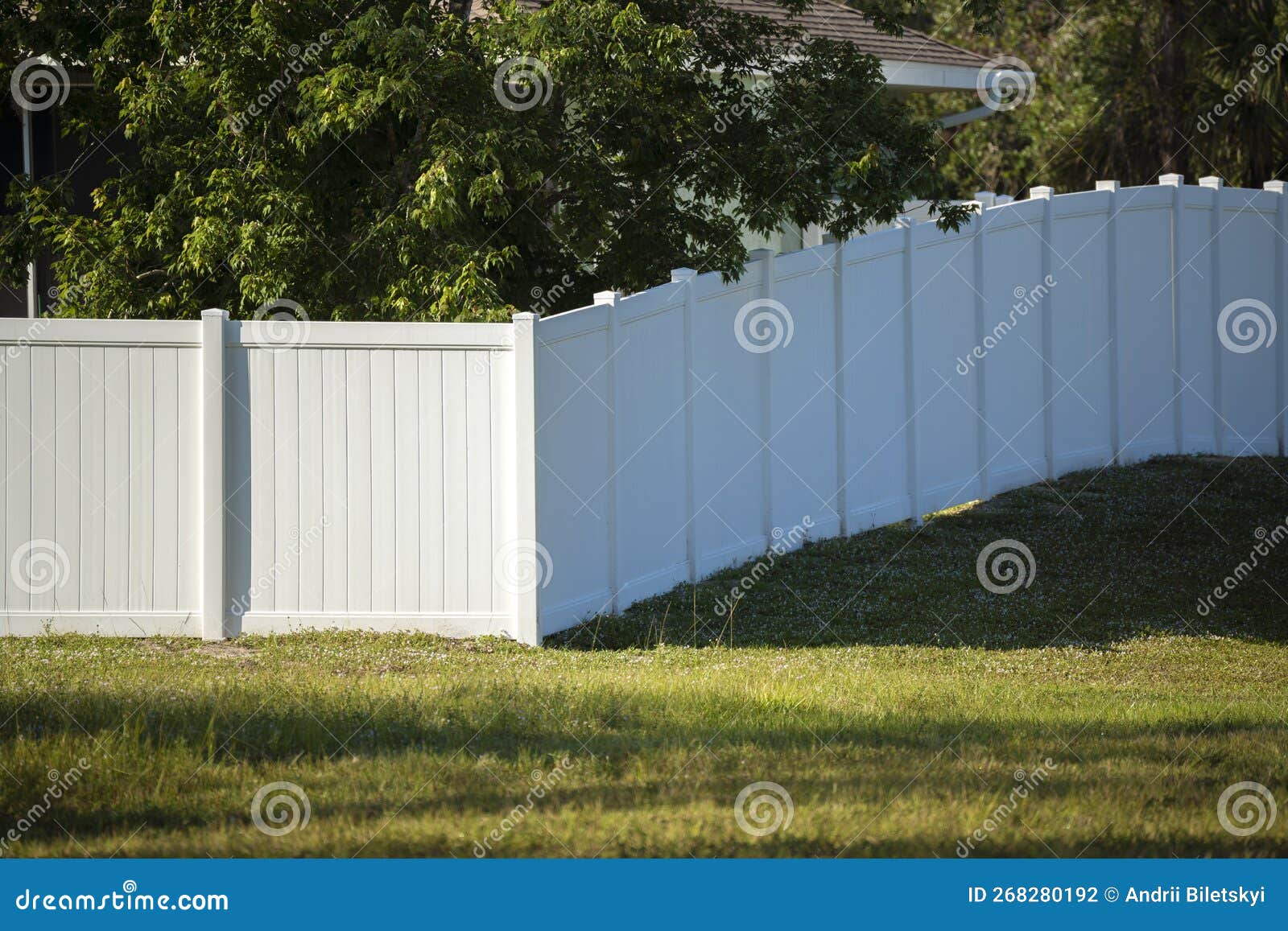 White Plastic Fence for Back Yard Protection and Privacy Stock Photo ...