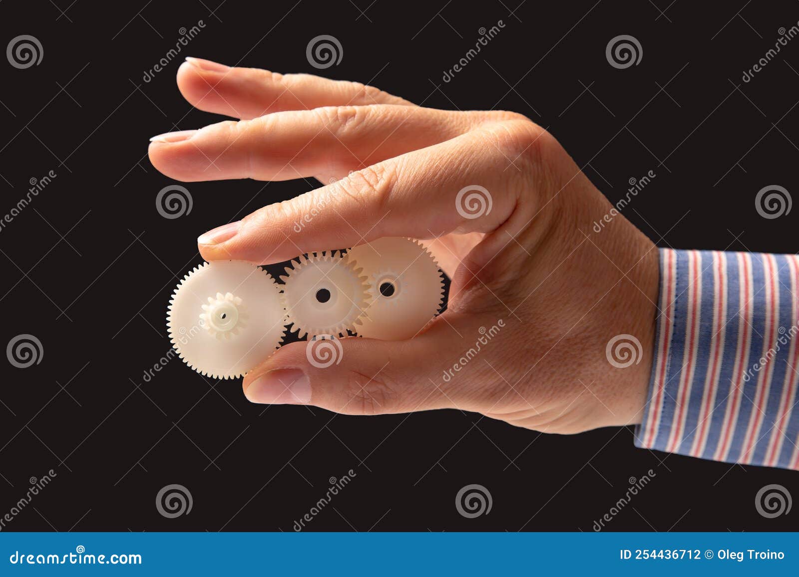 White Plastic Gears in Hand. Machine Motion Transmission Mechanism ...