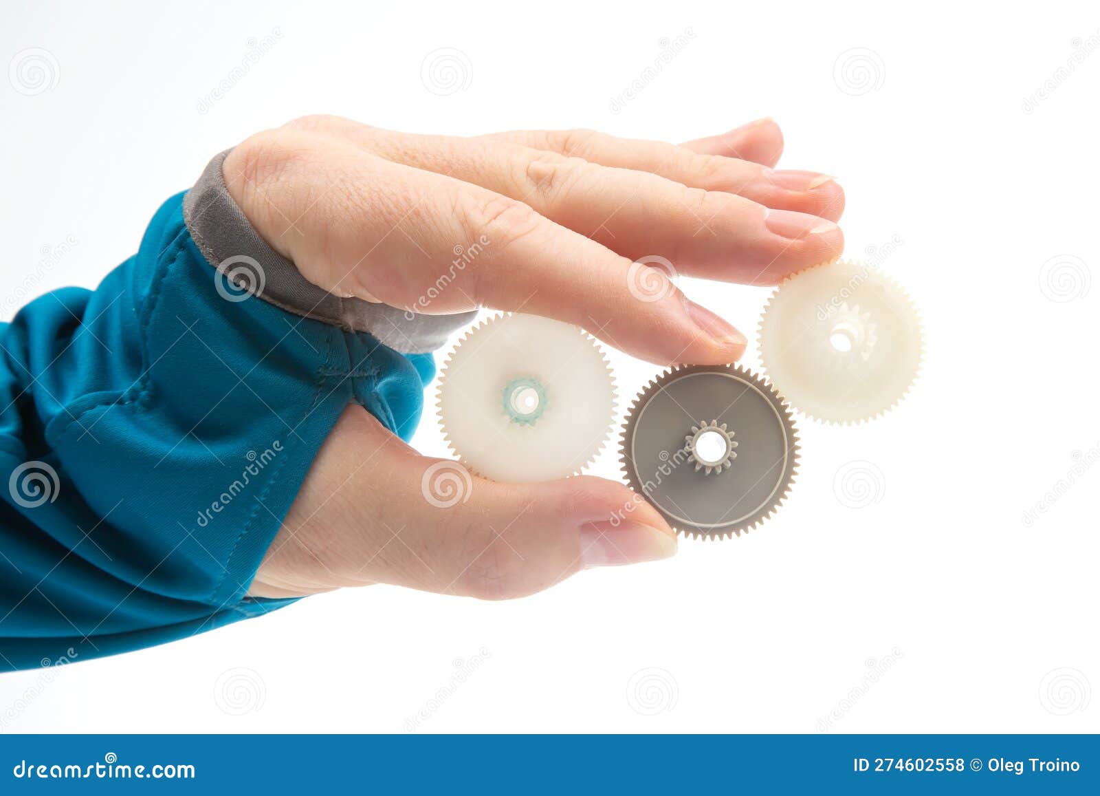 White Plastic Gears in Hand. Machine Motion Transmission Mechanism ...
