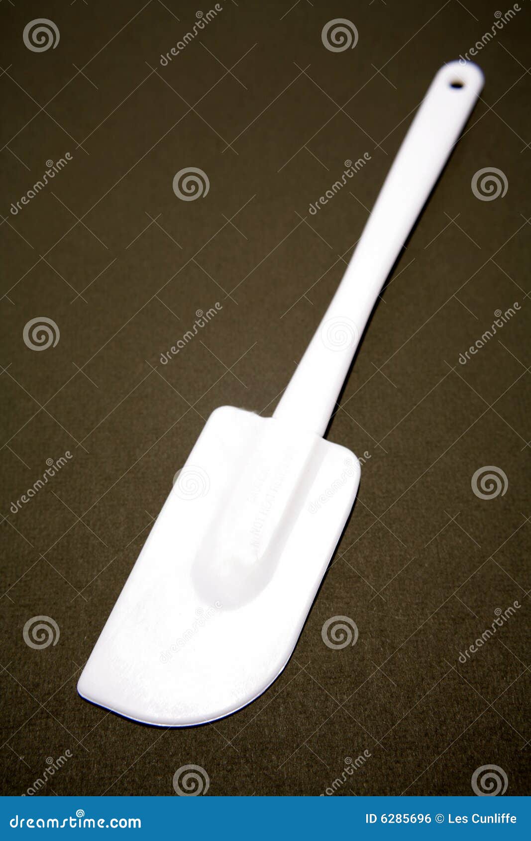 White plastic kitchen tool stock photo. Image of scraper - 6285696