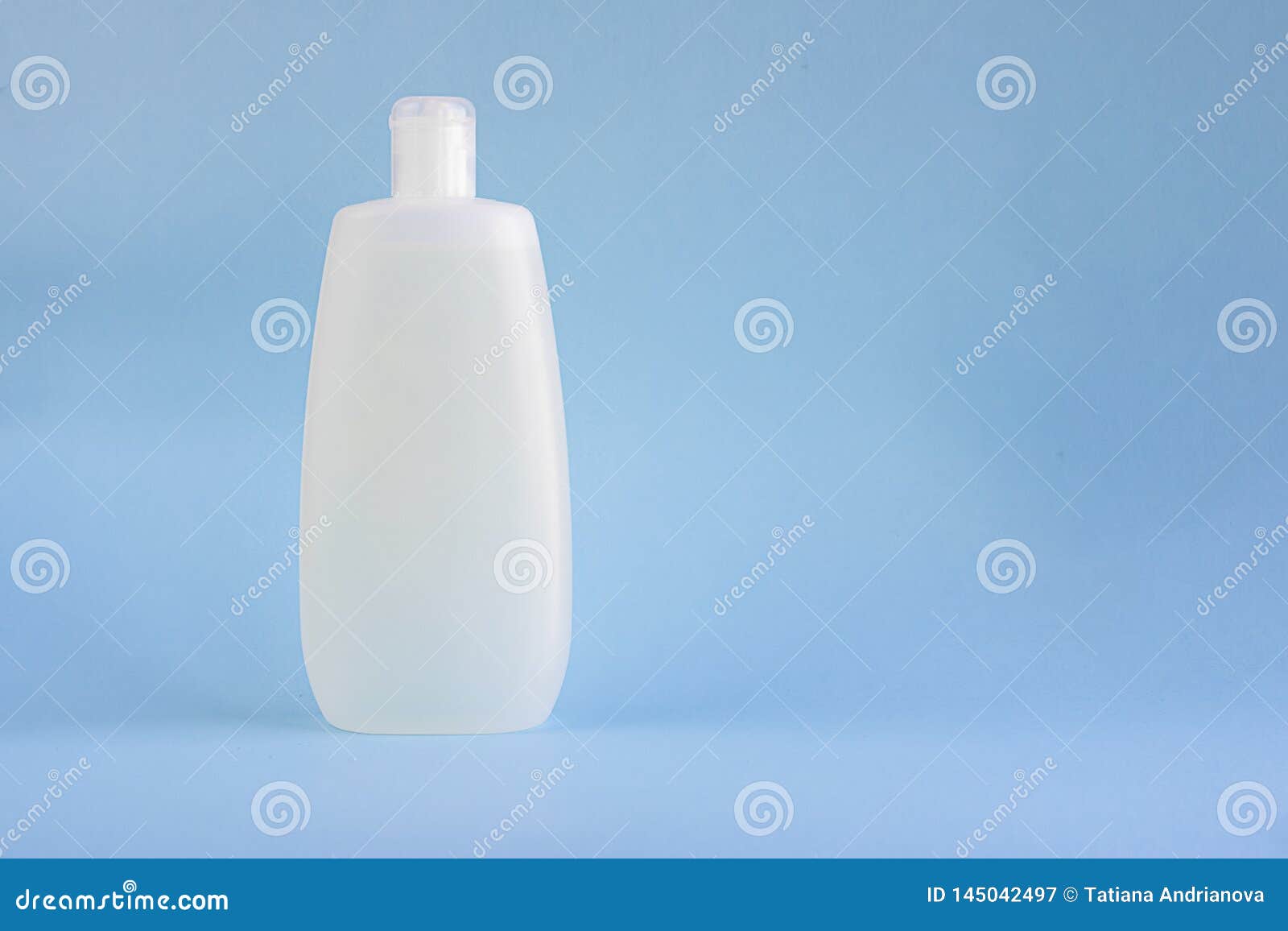White Plastic Mockup Bottle For Shampoo Or Shower Gel On Light Blue
