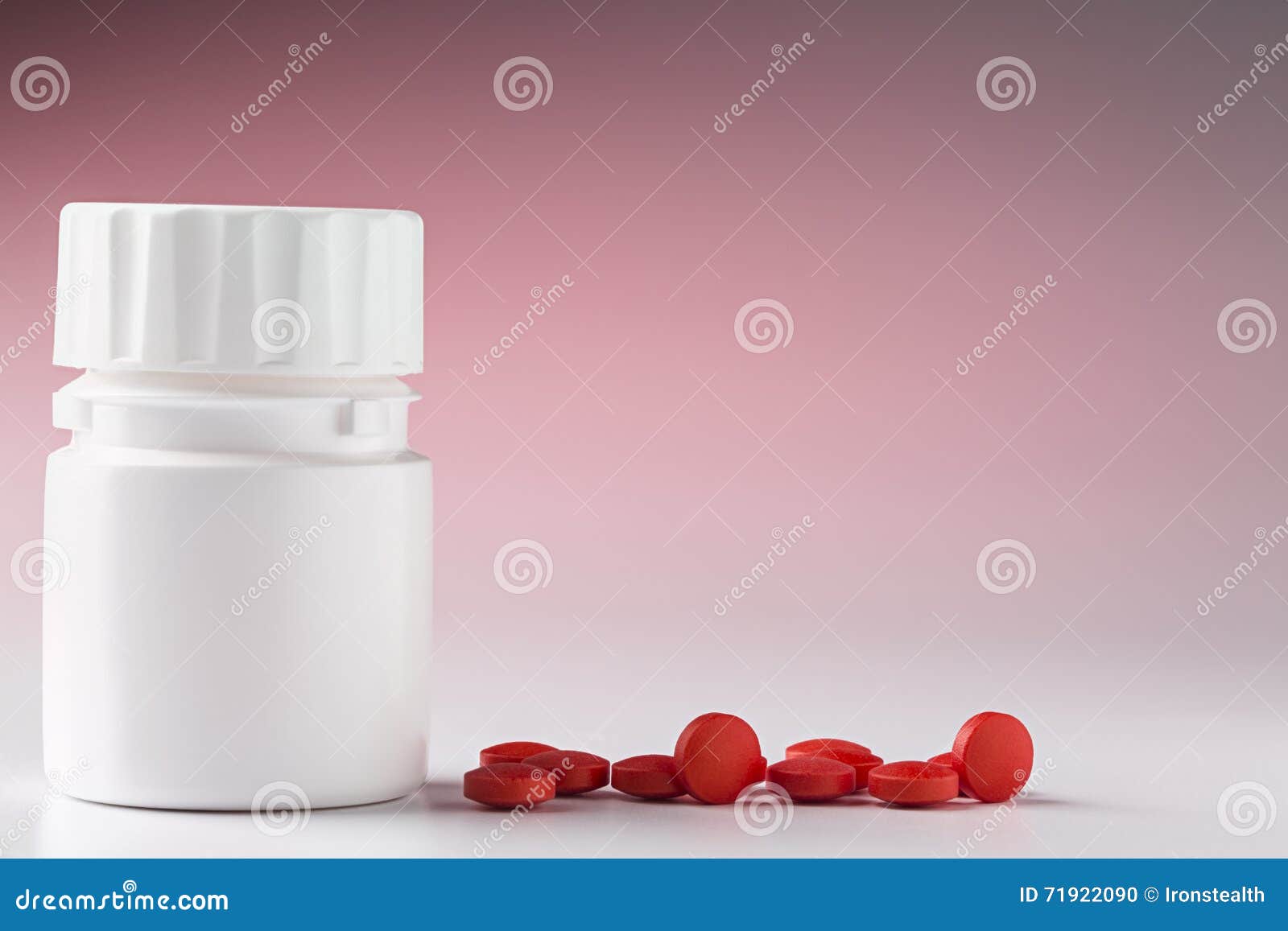 White Plastic Pill Bottle and Heap of Red Pills Stock Photo - Image of ...