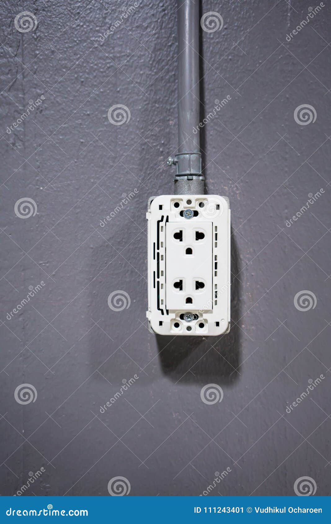 White Plastic Plug Socket Connected with Silver Metal Pipe in Vertical ...