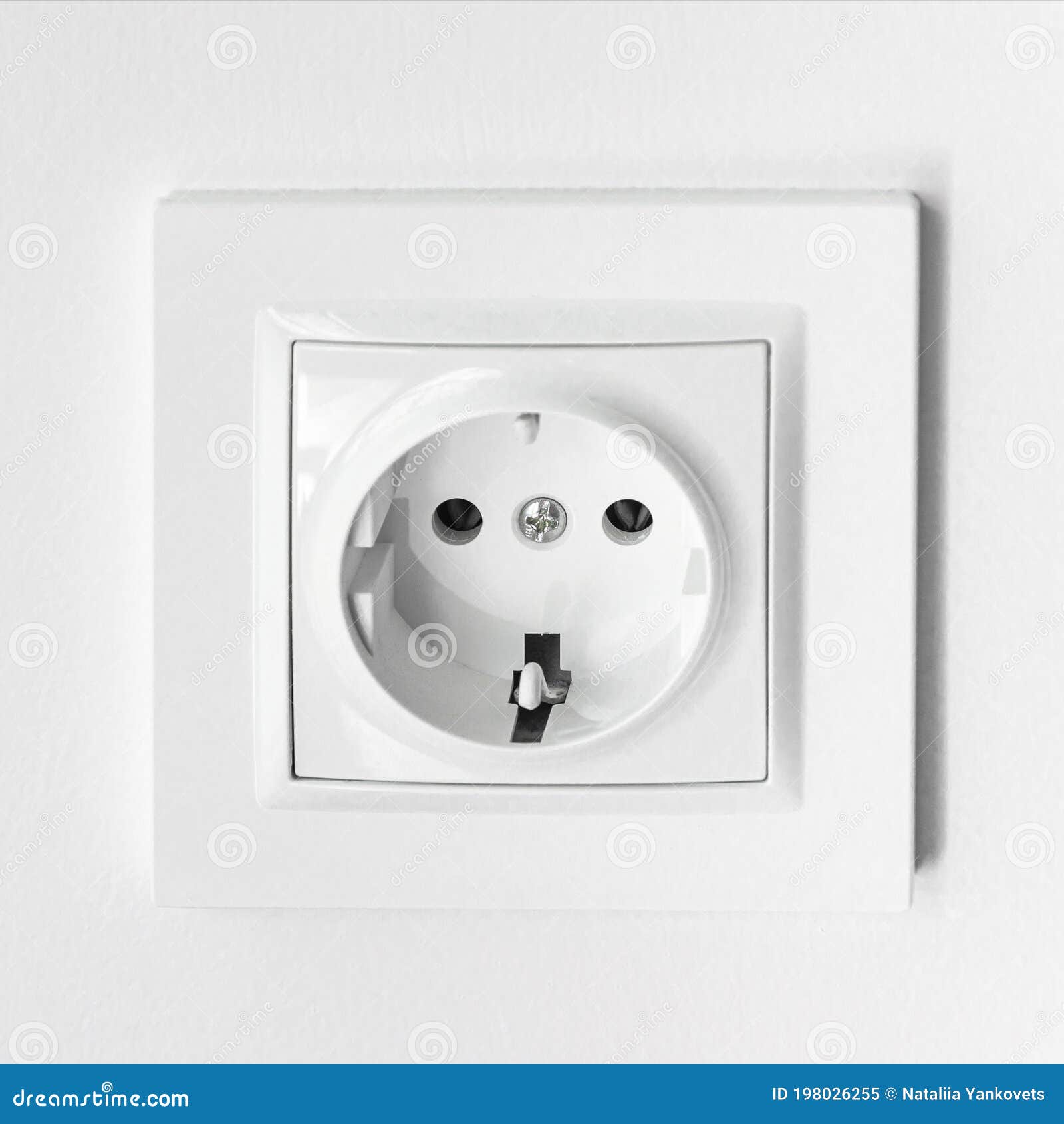 The White Plastic Socket is Mounted in a White Wall Stock Image - Image ...