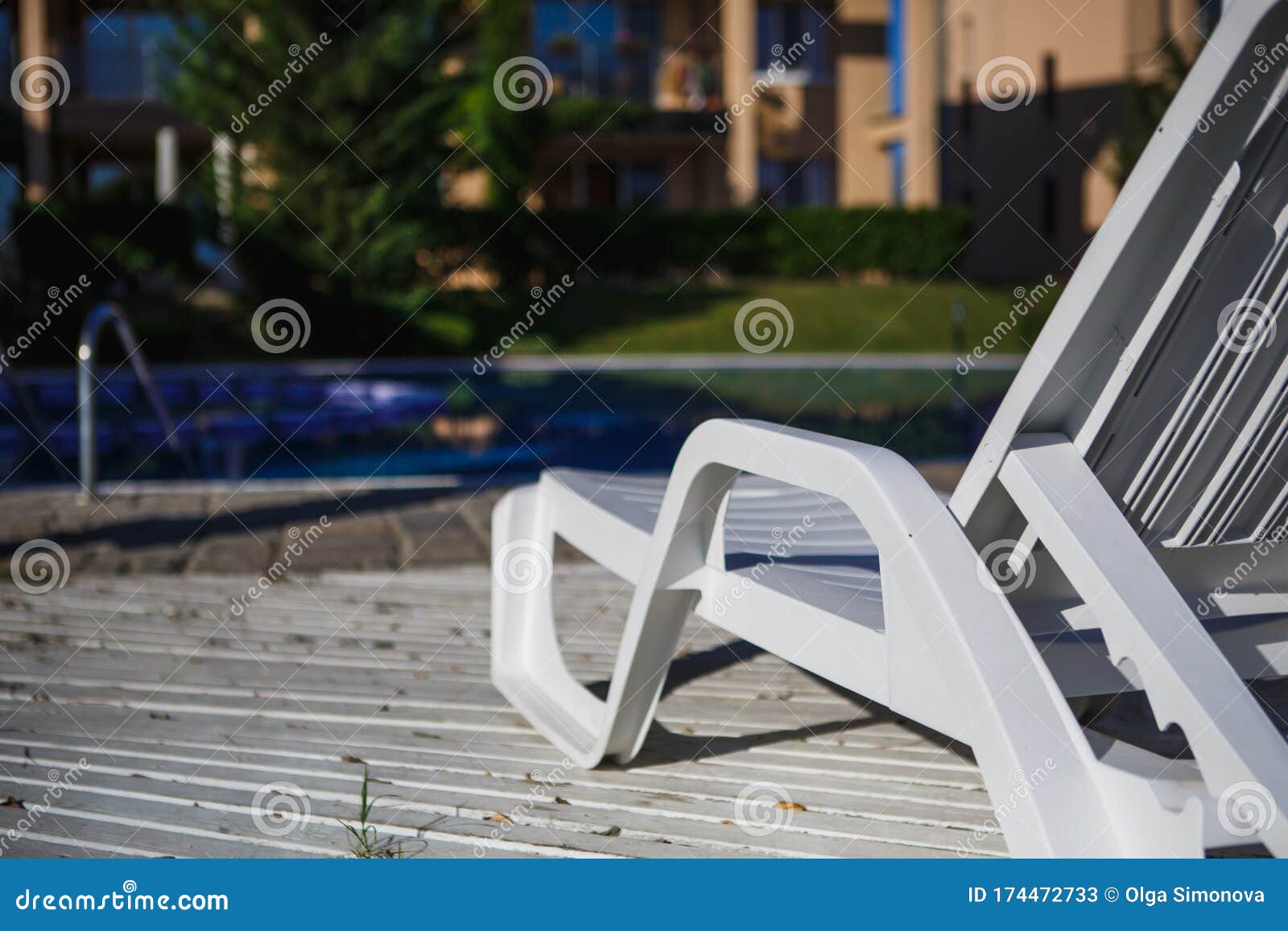 White Plastic Sun Beds by the Pool. Stock Image - Image of beds, chairs ...