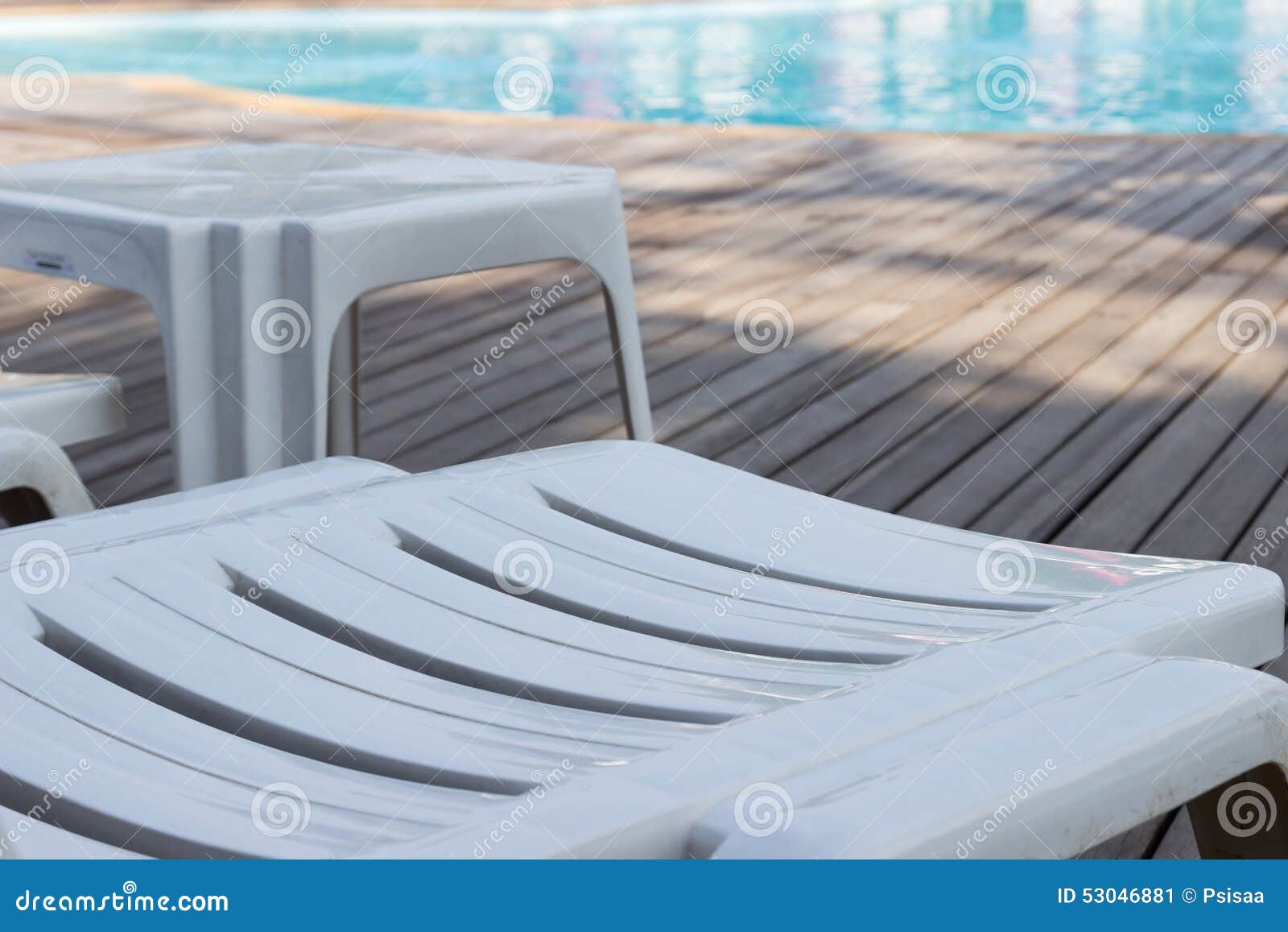 White Plastic Sunbed beside Swimming Pool Stock Image - Image of chair ...