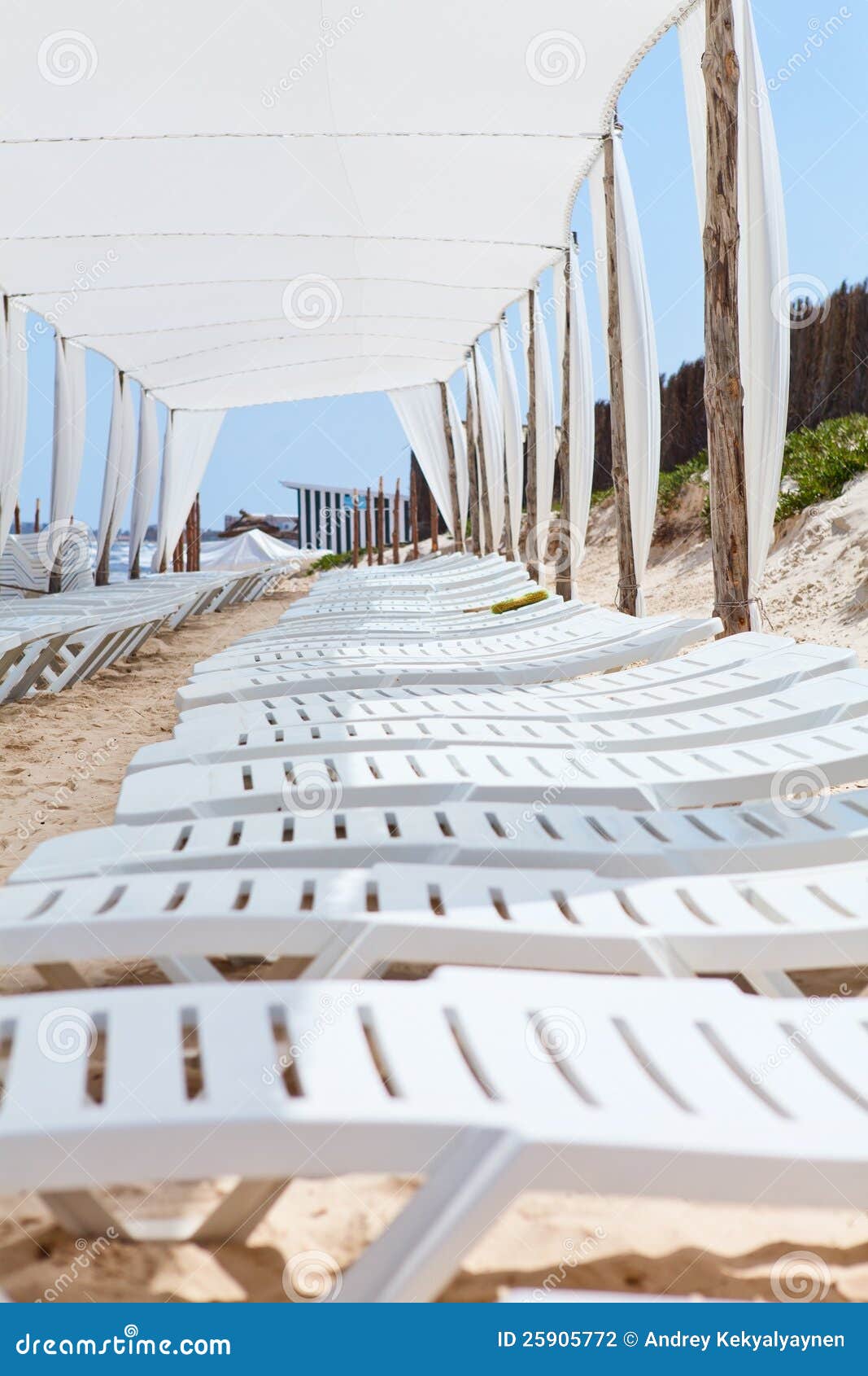 White Plastic Sunbeds in Sandy Beach Stock Photo - Image of deck, line ...