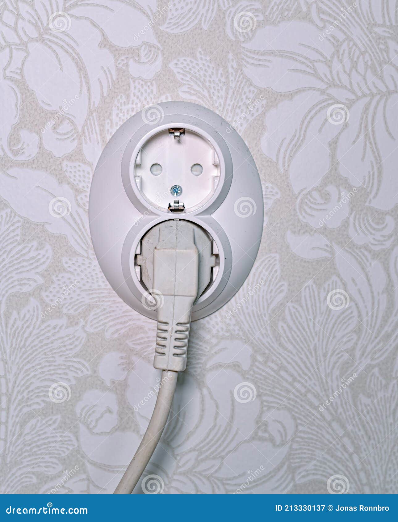 White Plastic Wall Socket on Wallpaper with One Plug Stock Image ...