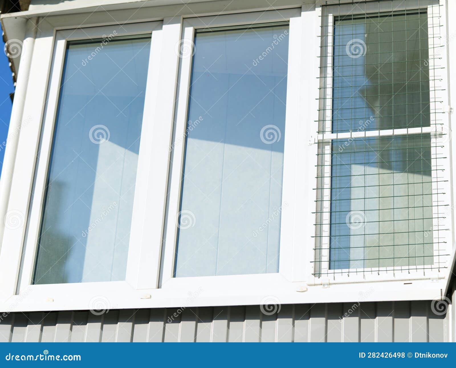 White Plastic Windows of the Balcony from the Outside. Close Stock ...