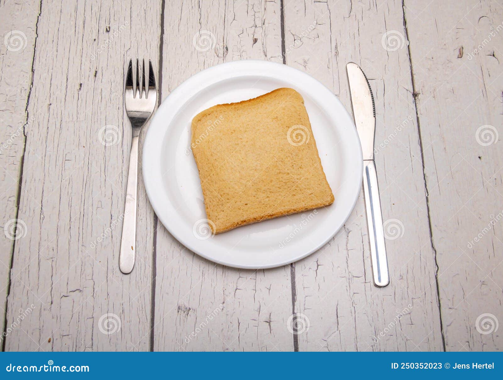 White Plate with Cutlery One Slice of Toast Stock Image - Image of ...