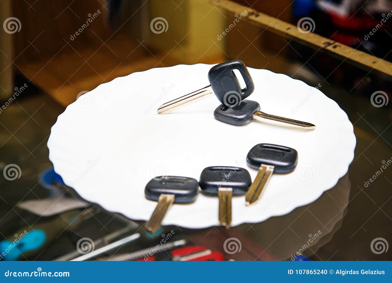 White Plate with Five Blank Car Keys Stock Photo - Image of shiny, hand ...