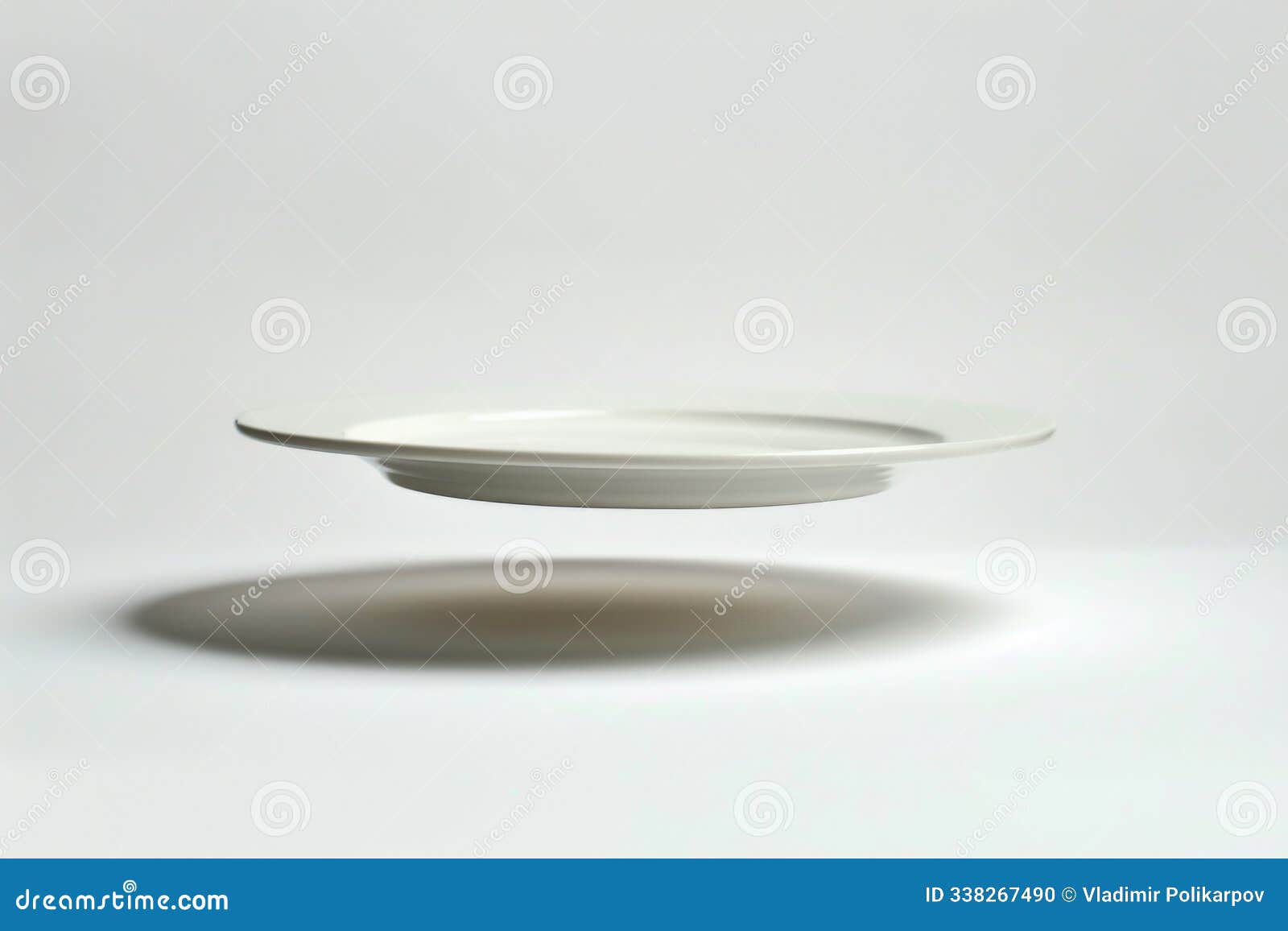 A White Plate Flying through the Air Stock Photo - Image of messy ...