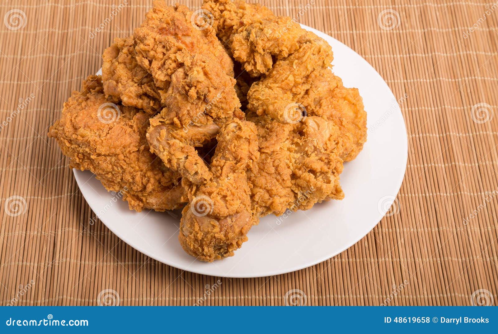 White Plate of Fried Chicken on Bamboo Mat Stock Photo - Image of ...