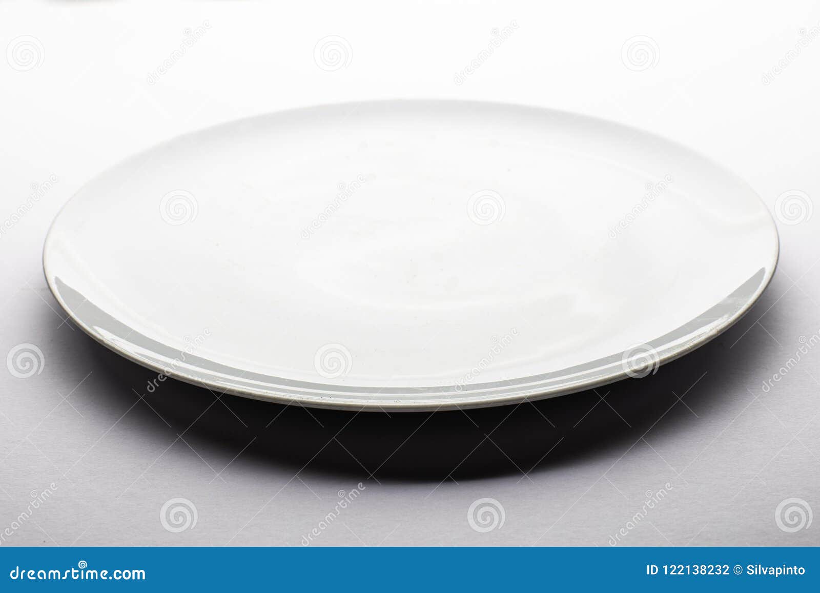 White Plate Front View Isolated on White Background. Stock Photo ...