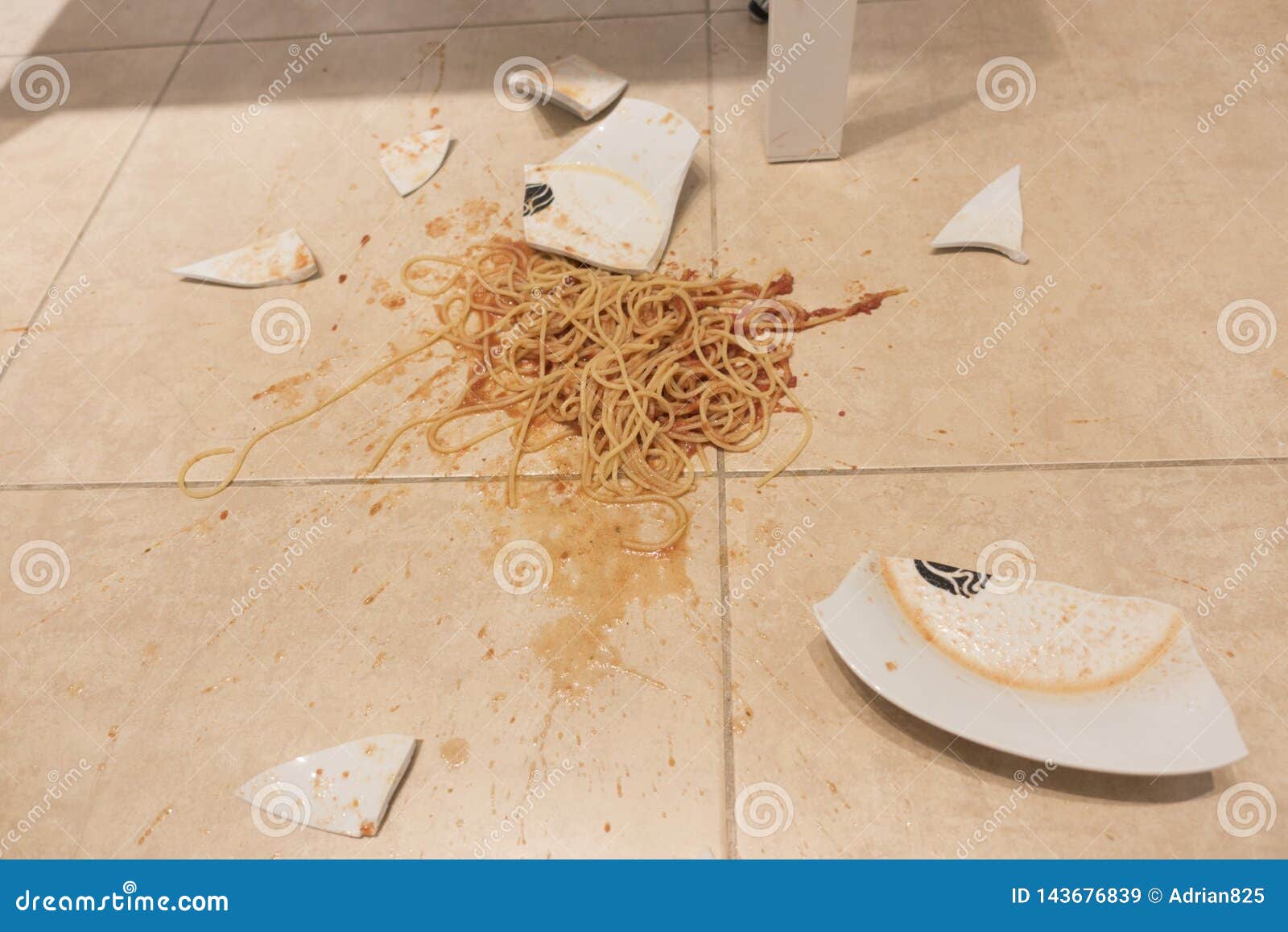 White Plate with Pasta Broken on Ceramic Floor in the Kitchen, Domestic ...