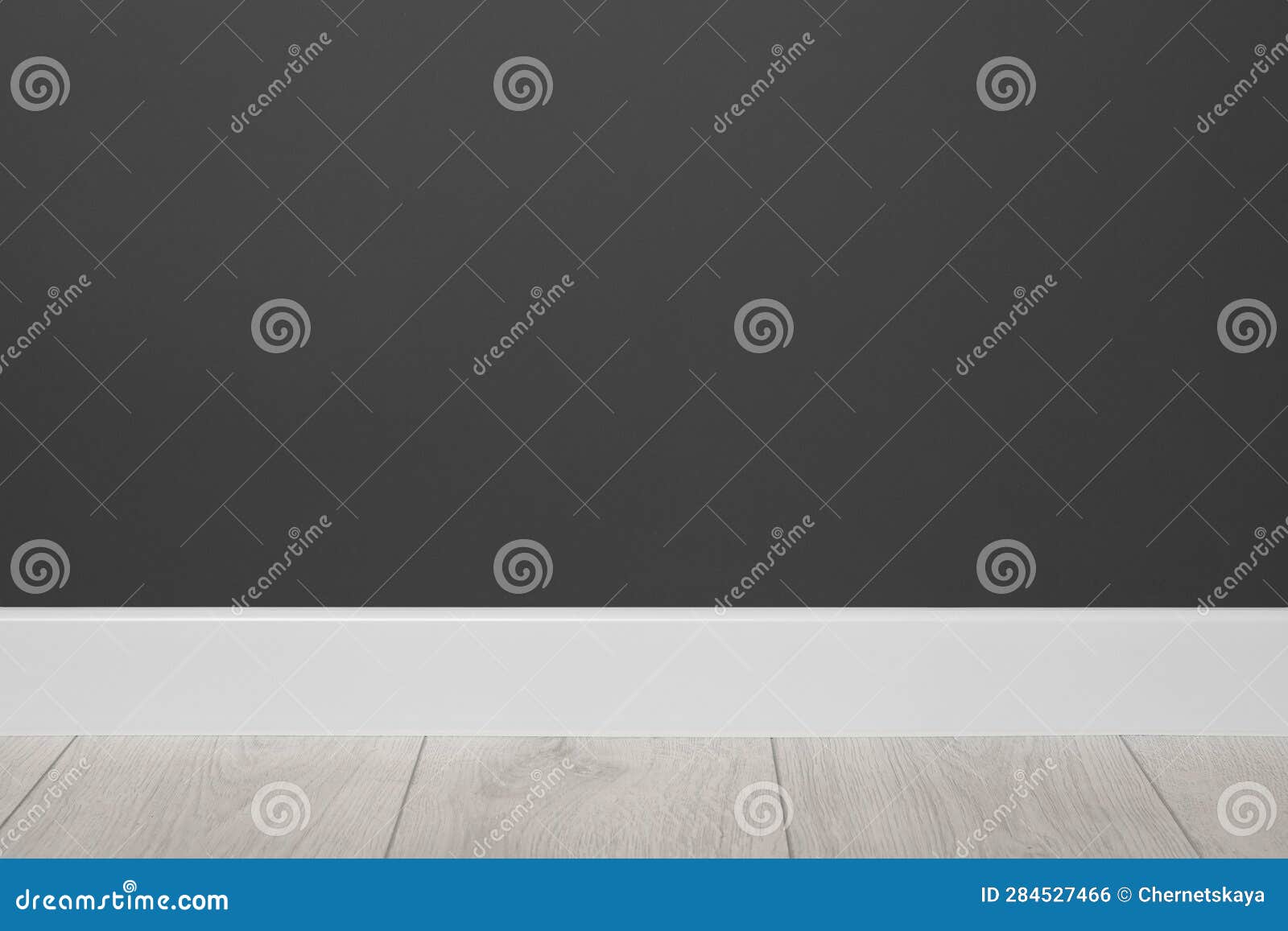 White Plinth on Laminated Floor Near Black Wall Indoors Stock Photo ...