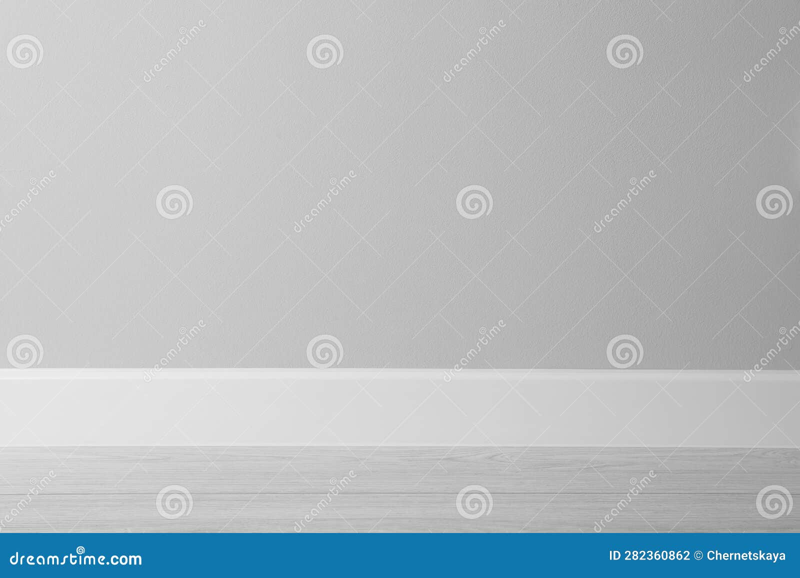White Plinth on Laminated Floor Near Wall Indoors Stock Photo - Image ...