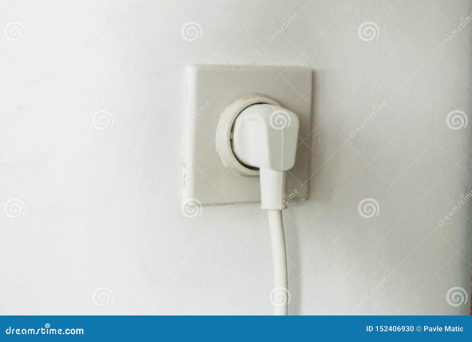 White plug in wall socket stock photo. Image of plug - 152406930