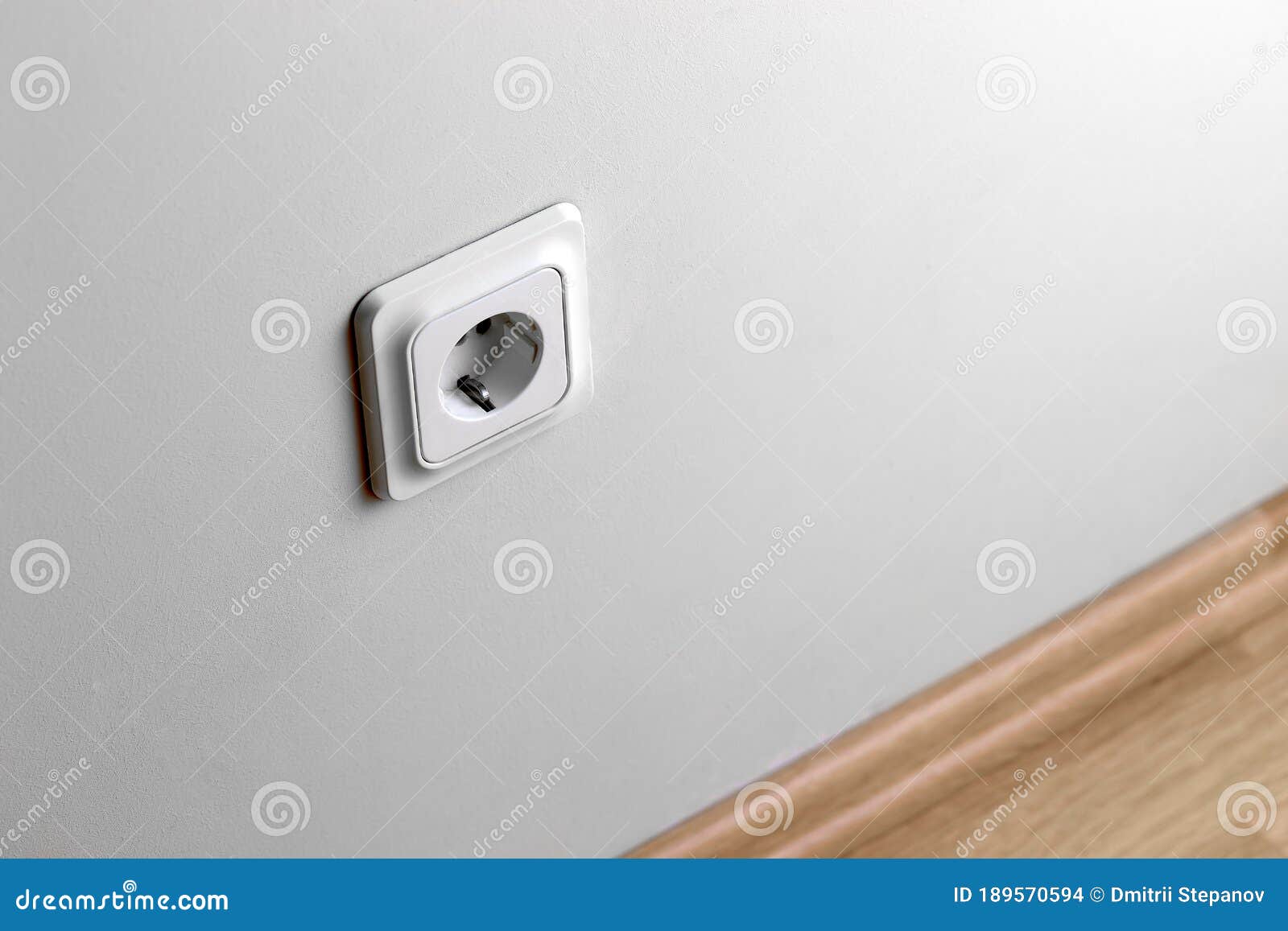 White Power Socket on Wall at Low Height from the Floor Stock Photo ...
